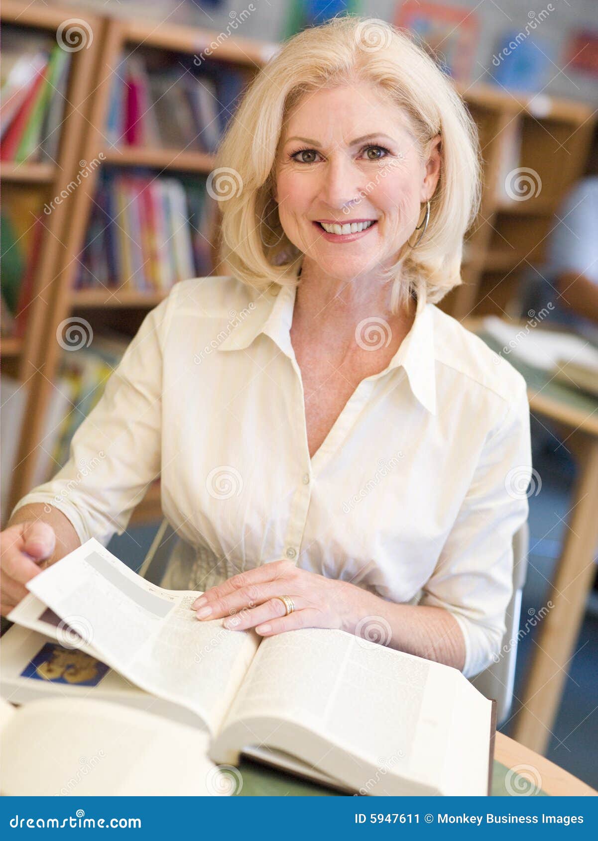 Mature Female Student Studying in Library Stock Image - Image of ...