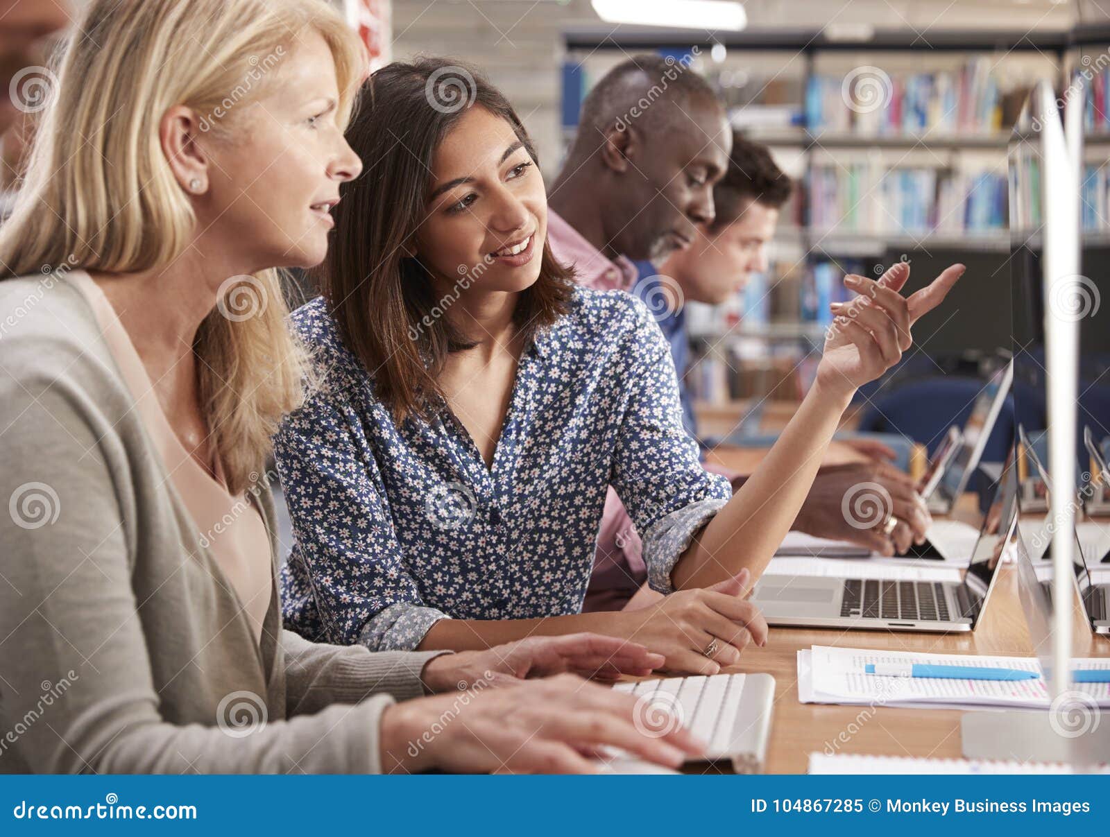 Mature Female Student with Tutor Learning Computer Skills Stock Image ...