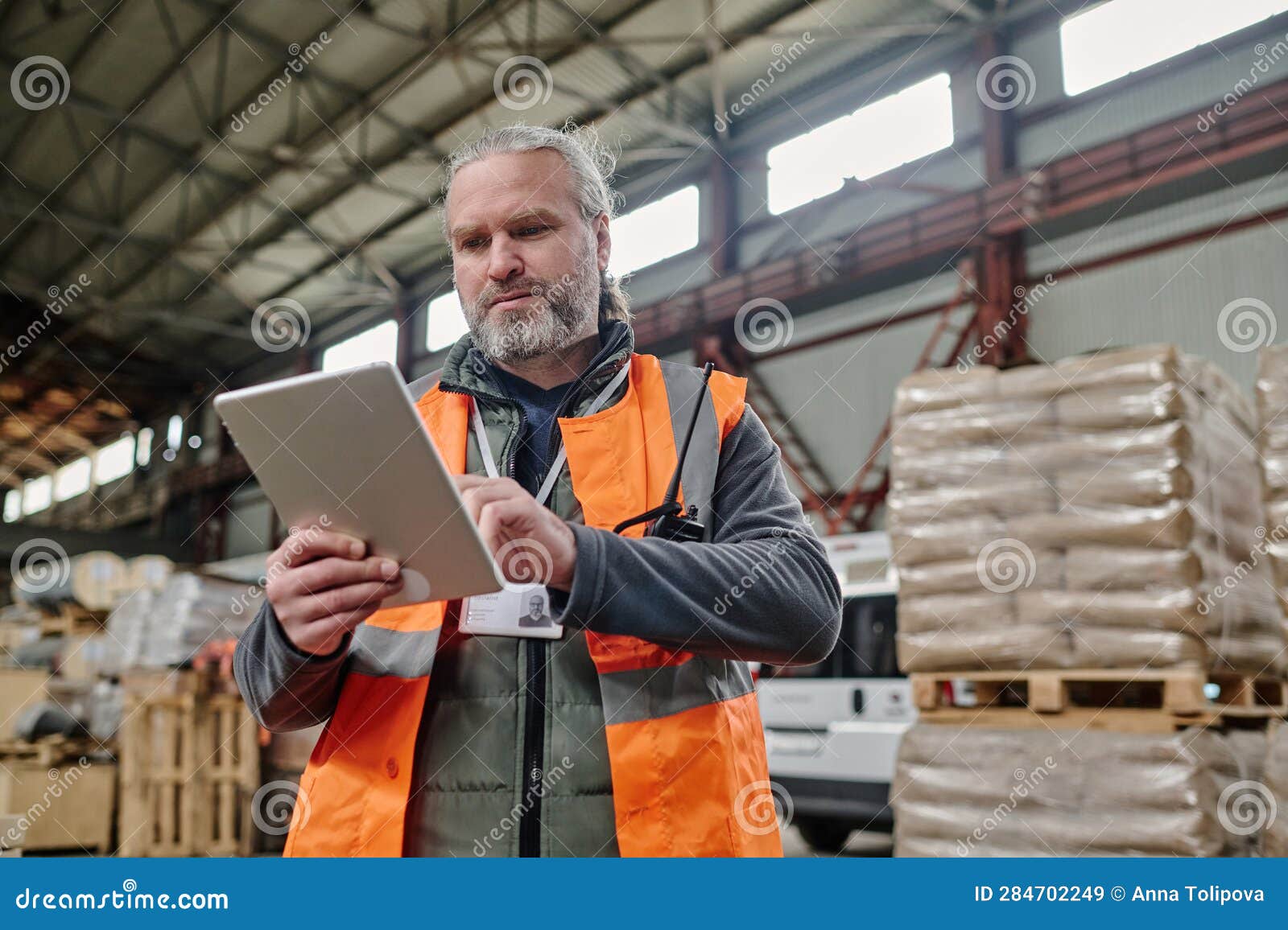 Foreman Using Tablet Pc in Warehouse Stock Image - Image of cargo ...