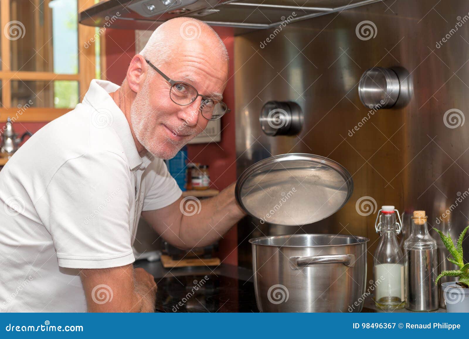Mature Handsome Man Cooking in Home Kitchen Stock Image - Image of ...