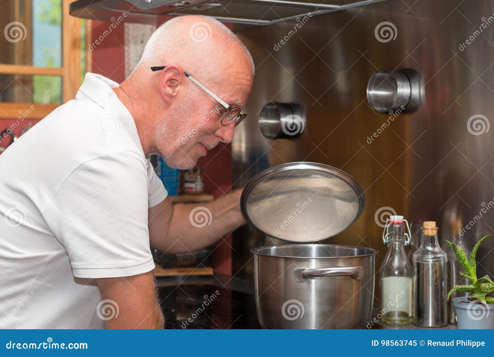 Mature Handsome Man Cooking in Home Kitchen Stock Image - Image of male ...