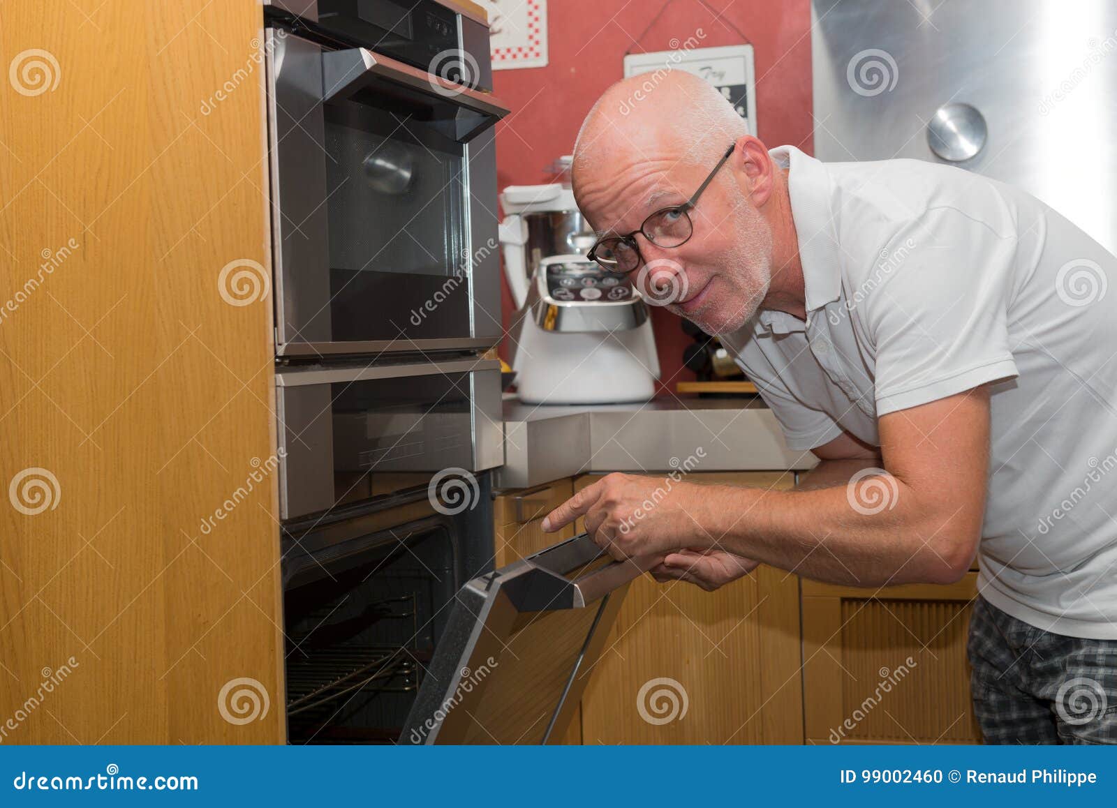 Mature Handsome Man Cooking in Home Kitchen Stock Photo - Image of home ...