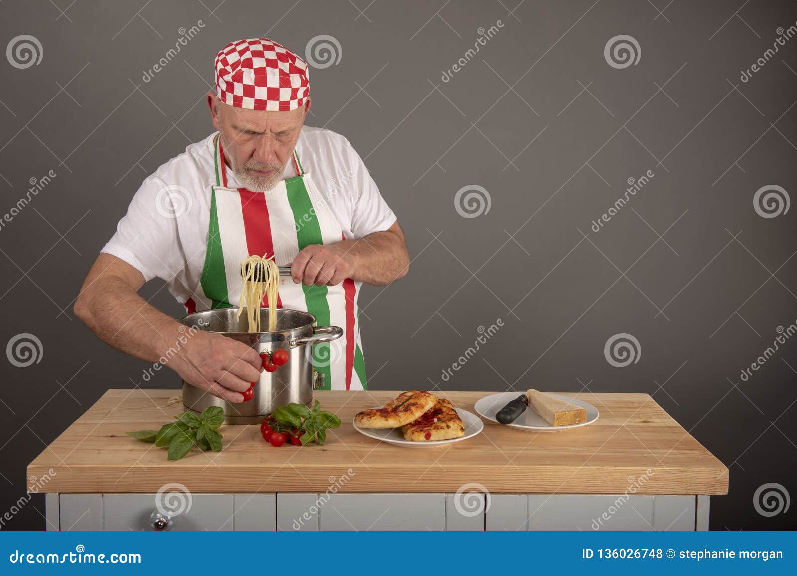 Mature Italian Chef Plating Up a Pasta Dish Stock Photo - Image of ...