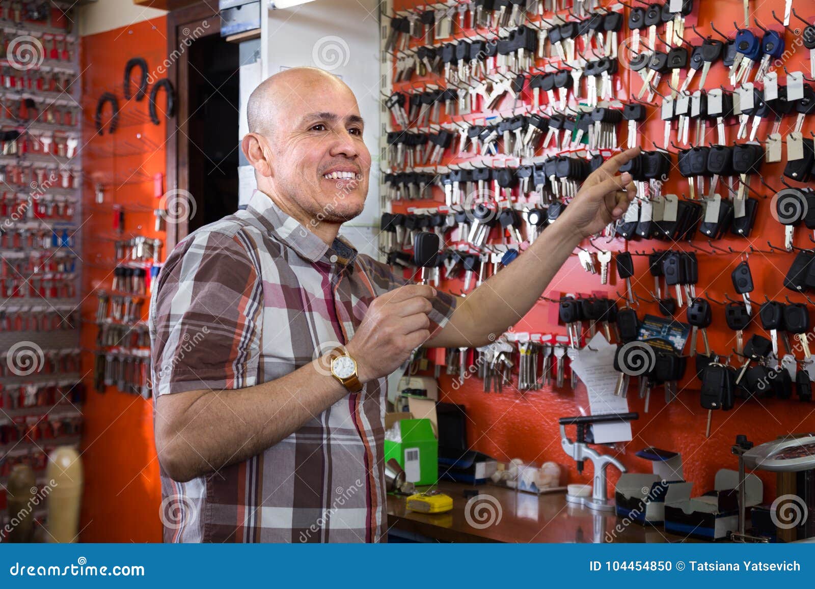 Mature Key Workman Near Stand with Auto Keys Stock Photo - Image of ...