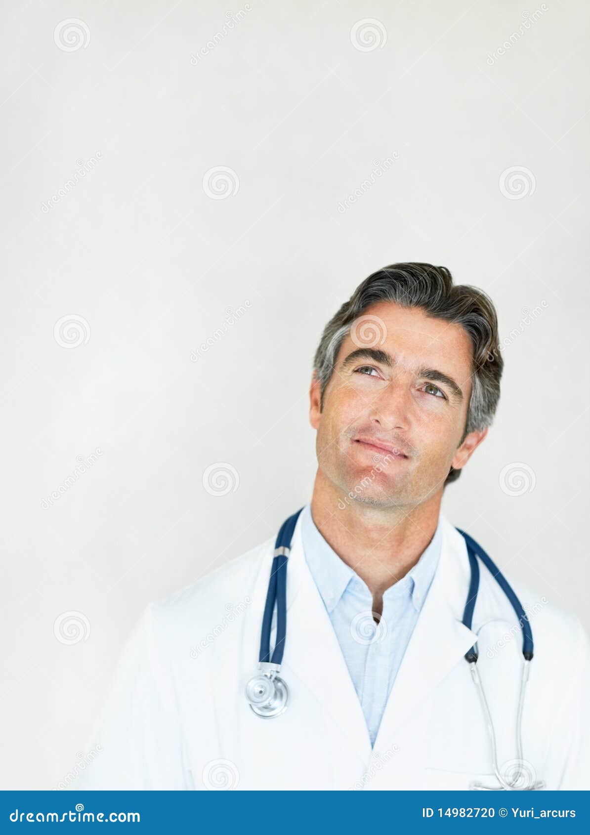 Mature Male Doctor Looking Up Stock Photo - Image of middle, background ...