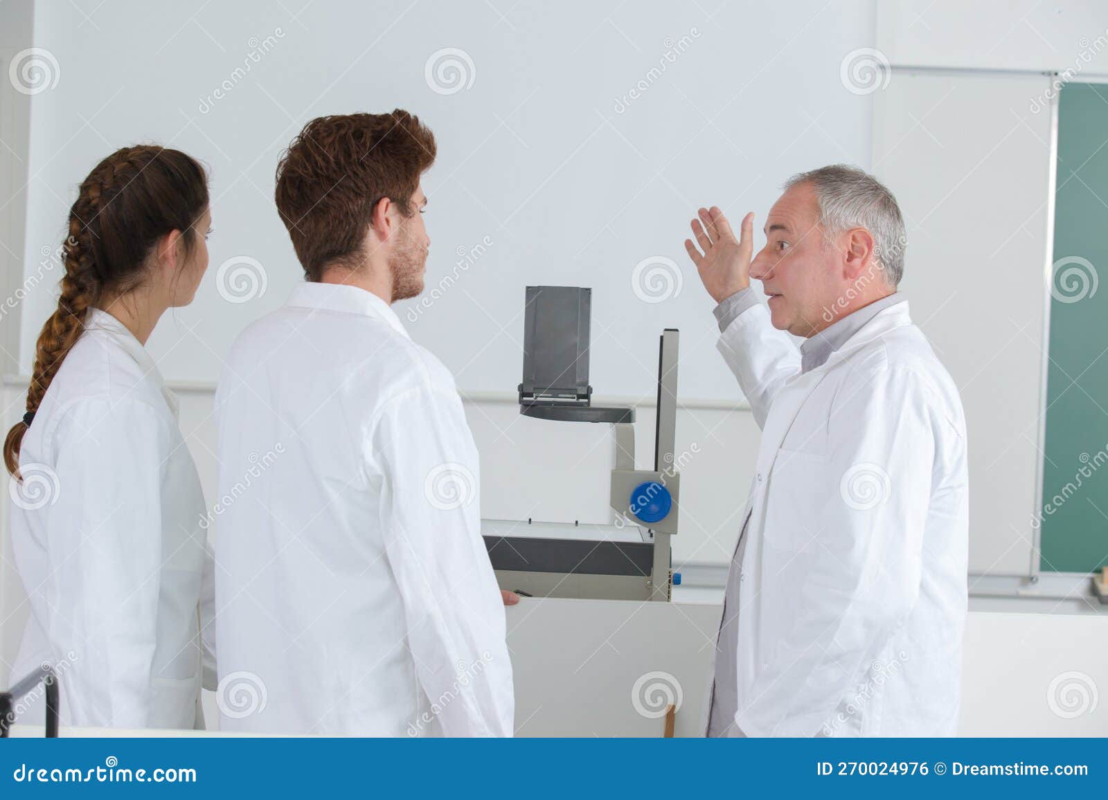 Mature Male Professor in Front Students in Classroom Stock Photo ...