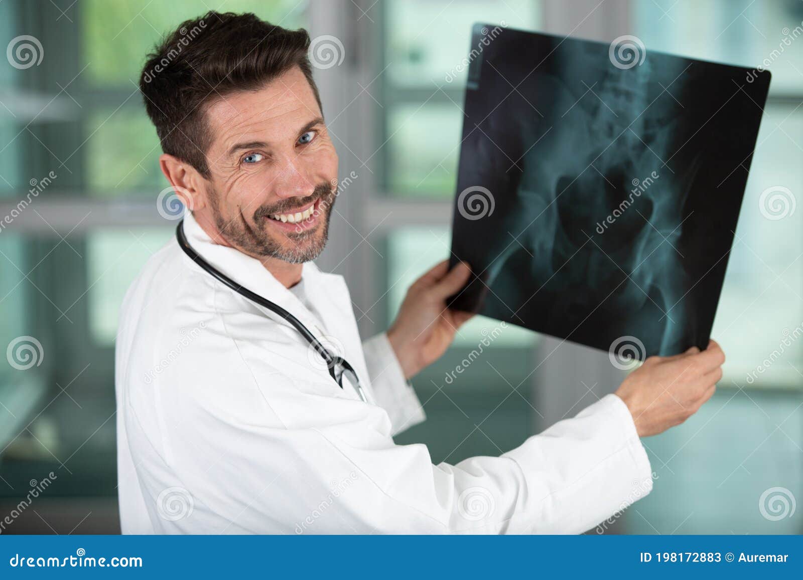 Mature Male Radiologist Holding X-ray Stock Image - Image of bone ...