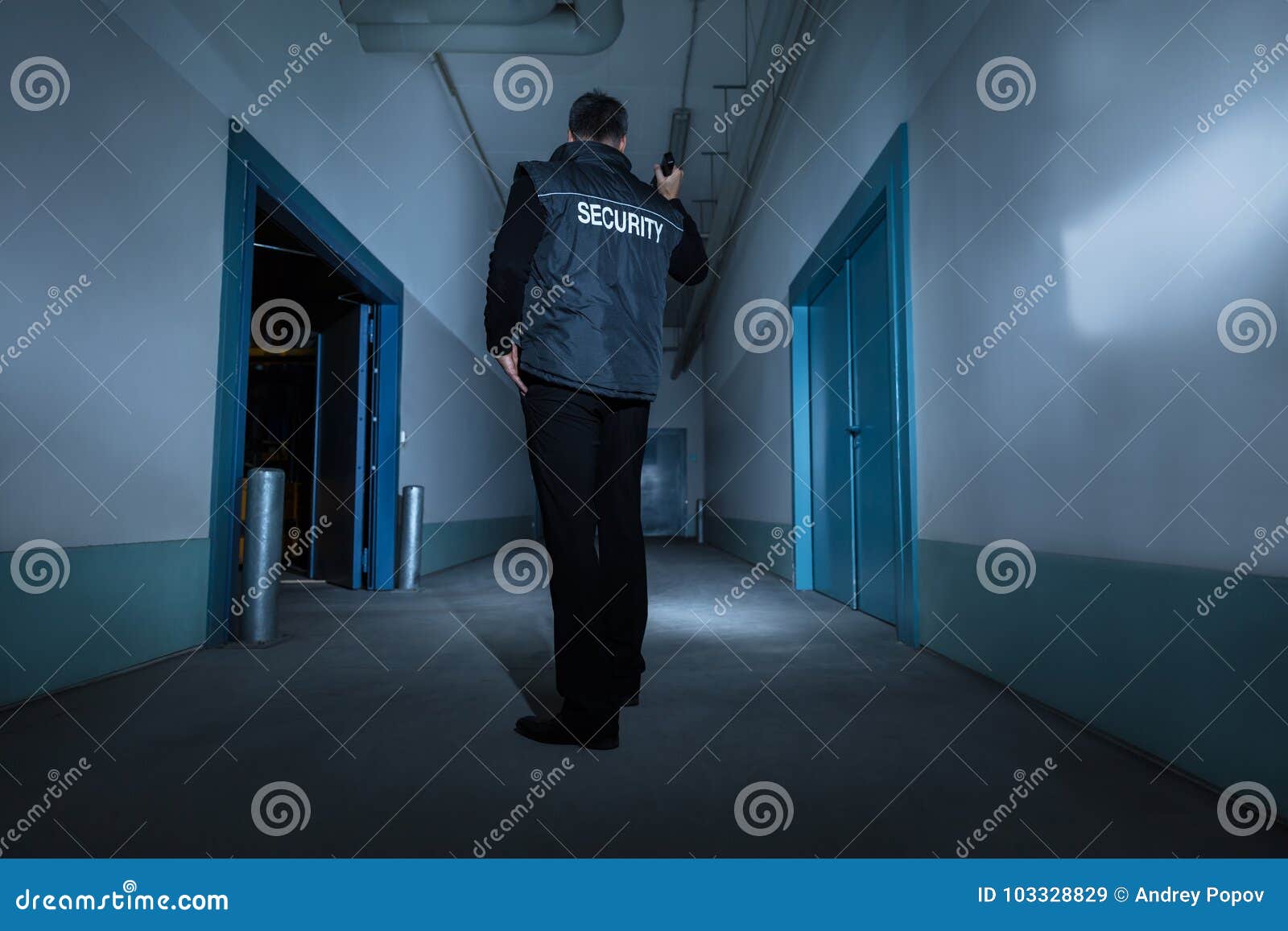Security Guard Standing in Corridor of Building Stock Image - Image of ...