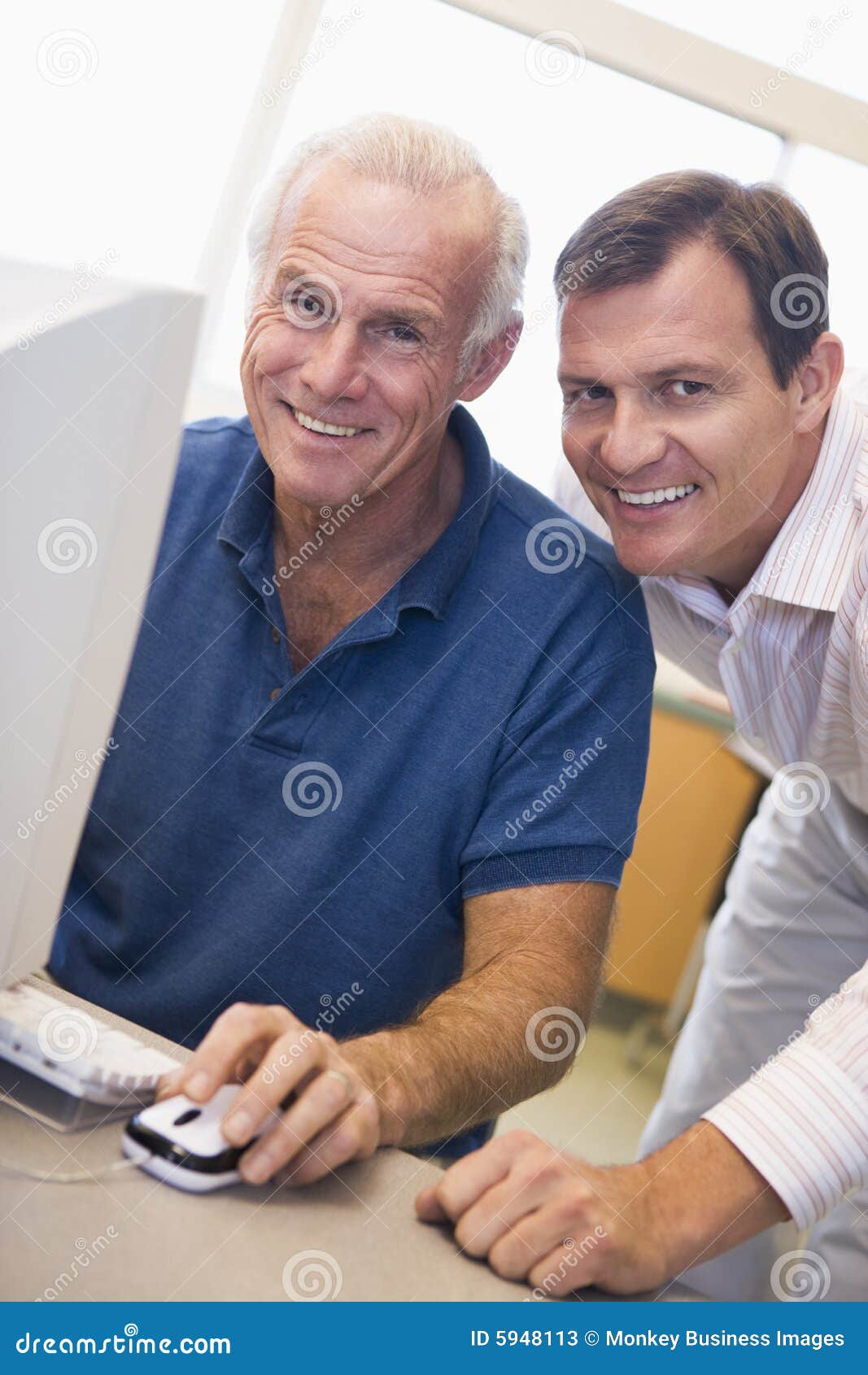 Mature Male Student Learning Computer Skills Stock Image - Image of ...