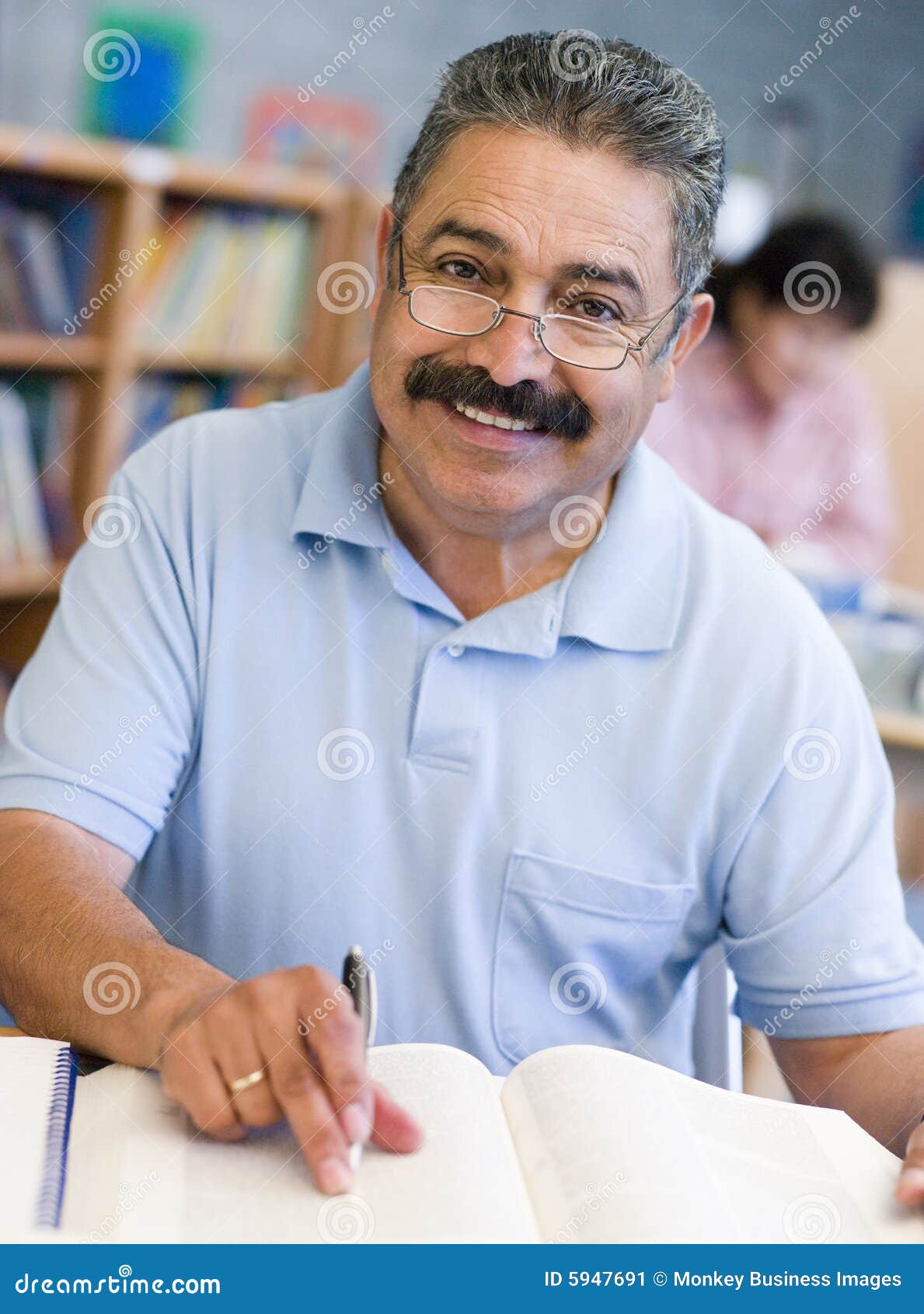 Mature Male Student Studying in Library Stock Image - Image of looking ...