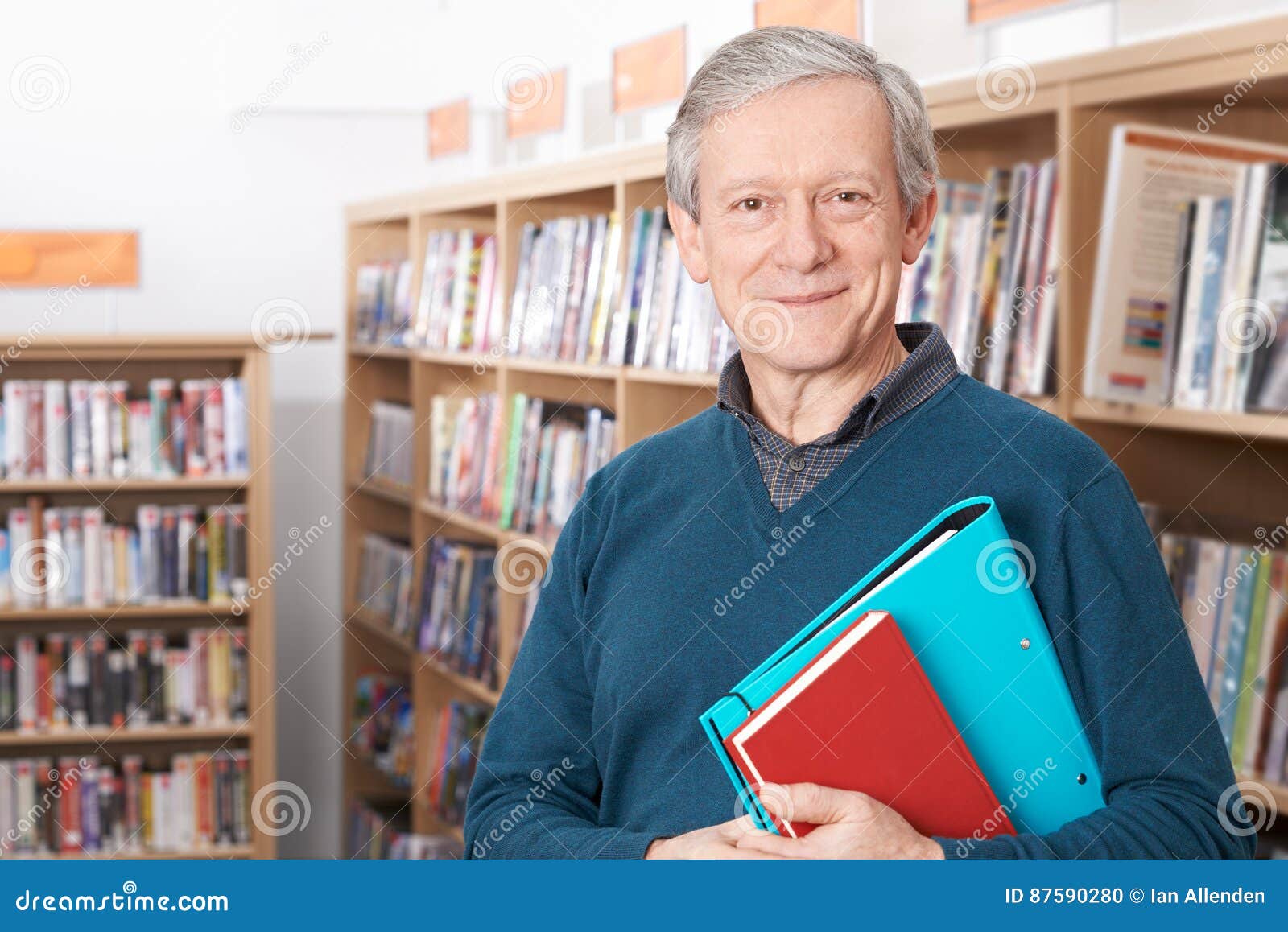 Mature Male Student Studying in Library Stock Photo - Image of ...