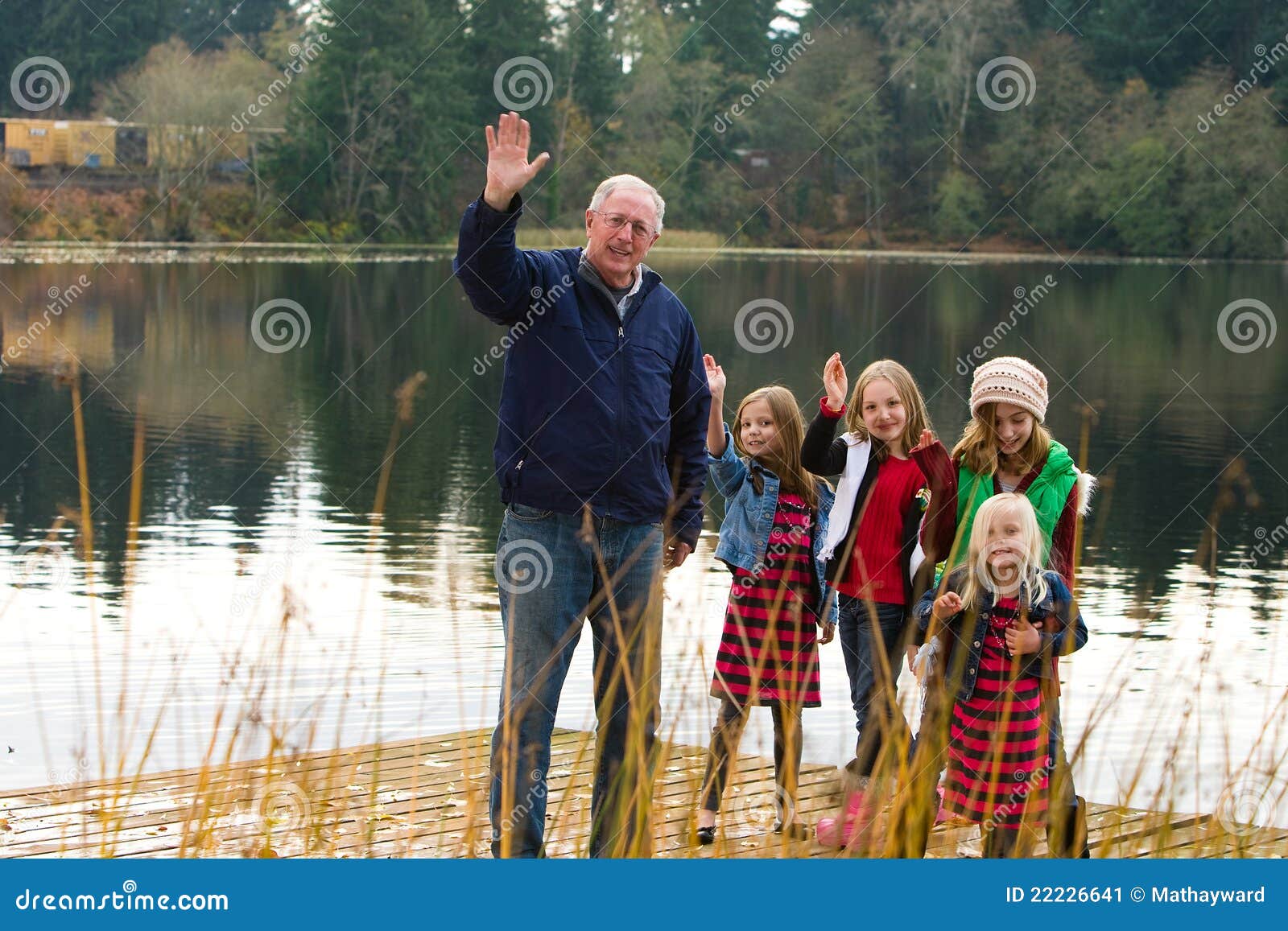Mature Man with Children Waving Stock Image - Image of retired, mature ...