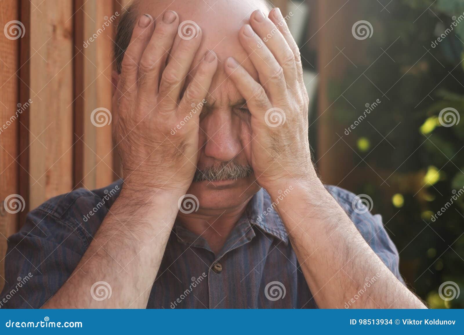 Mature Man Closing Face with Hands because of Terrible Headache or he ...