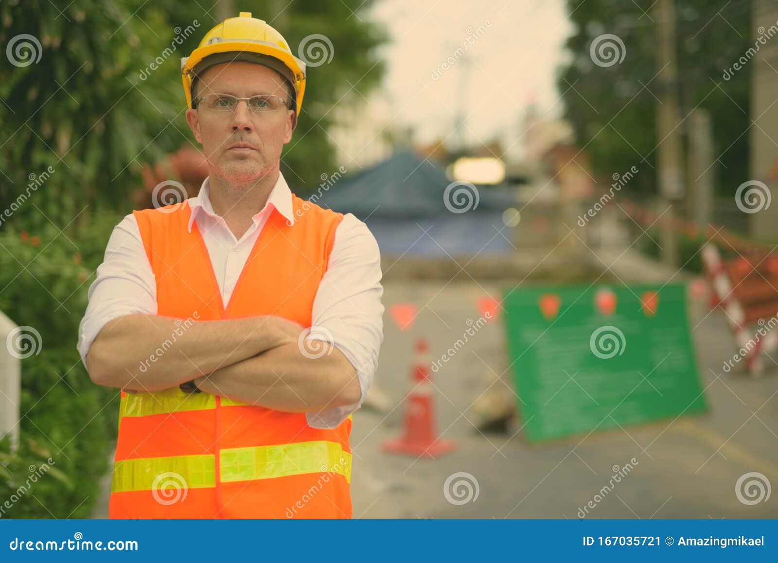 Mature Man Construction Worker at the Construction Site in the City ...