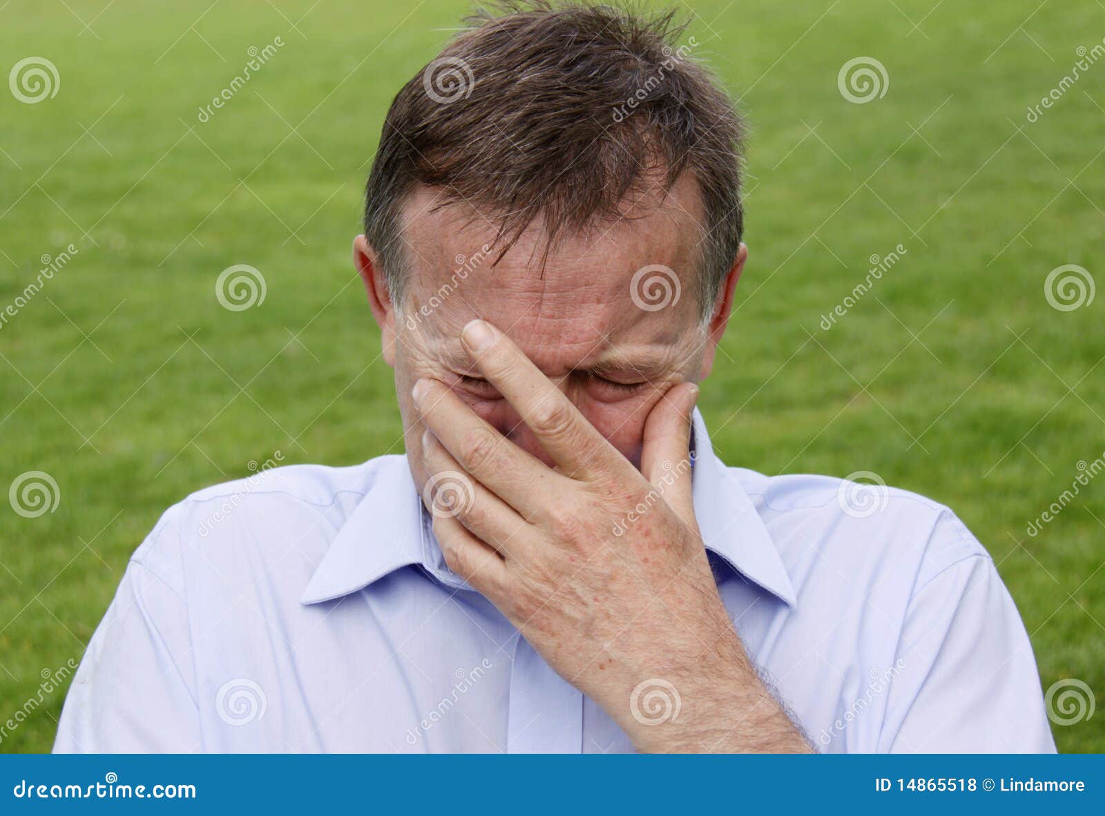 Mature Man Crying with Hand Partially Covering His Face Stock Photo ...