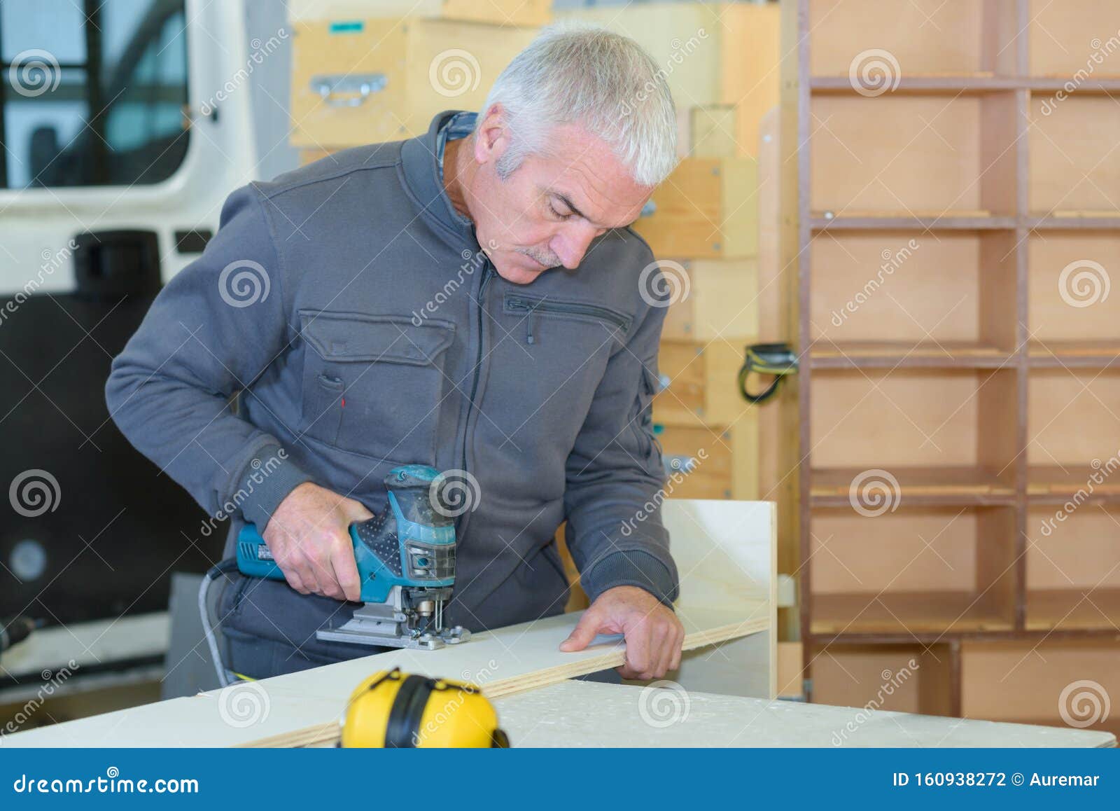Mature Man Cutting Wood with Saw Blade Stock Photo - Image of metal ...