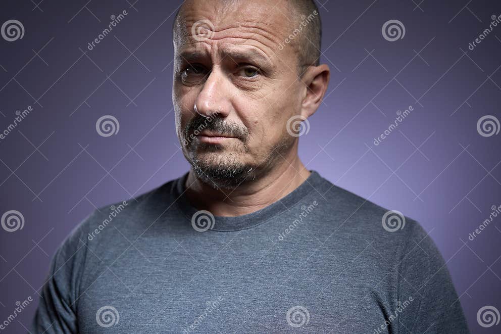Mature Man with an Expression of Skepticism Stock Photo - Image of ...