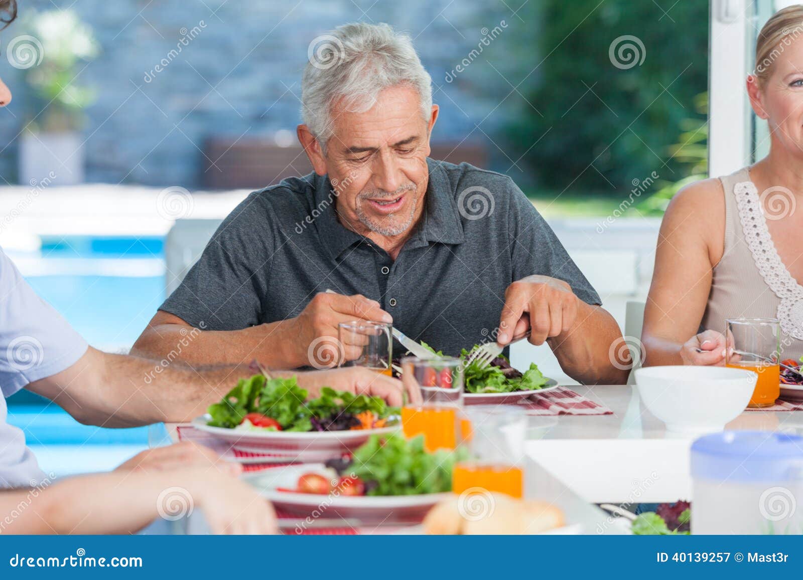 Mature Man with Family Dinner Table Stock Image - Image of latin, lunch ...