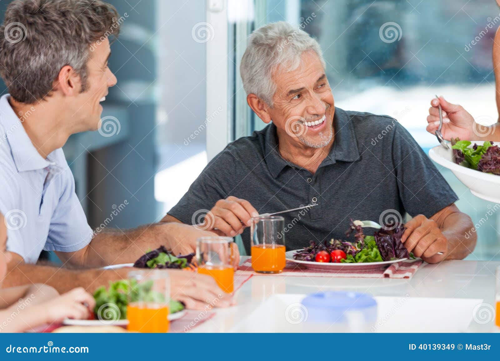 Mature Man with Family Dinner Table Stock Image - Image of generation ...
