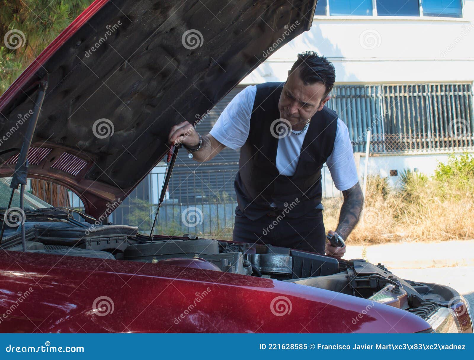 Mature Man Repair a Breakdown in His Car Engine with Tools Stock Image ...
