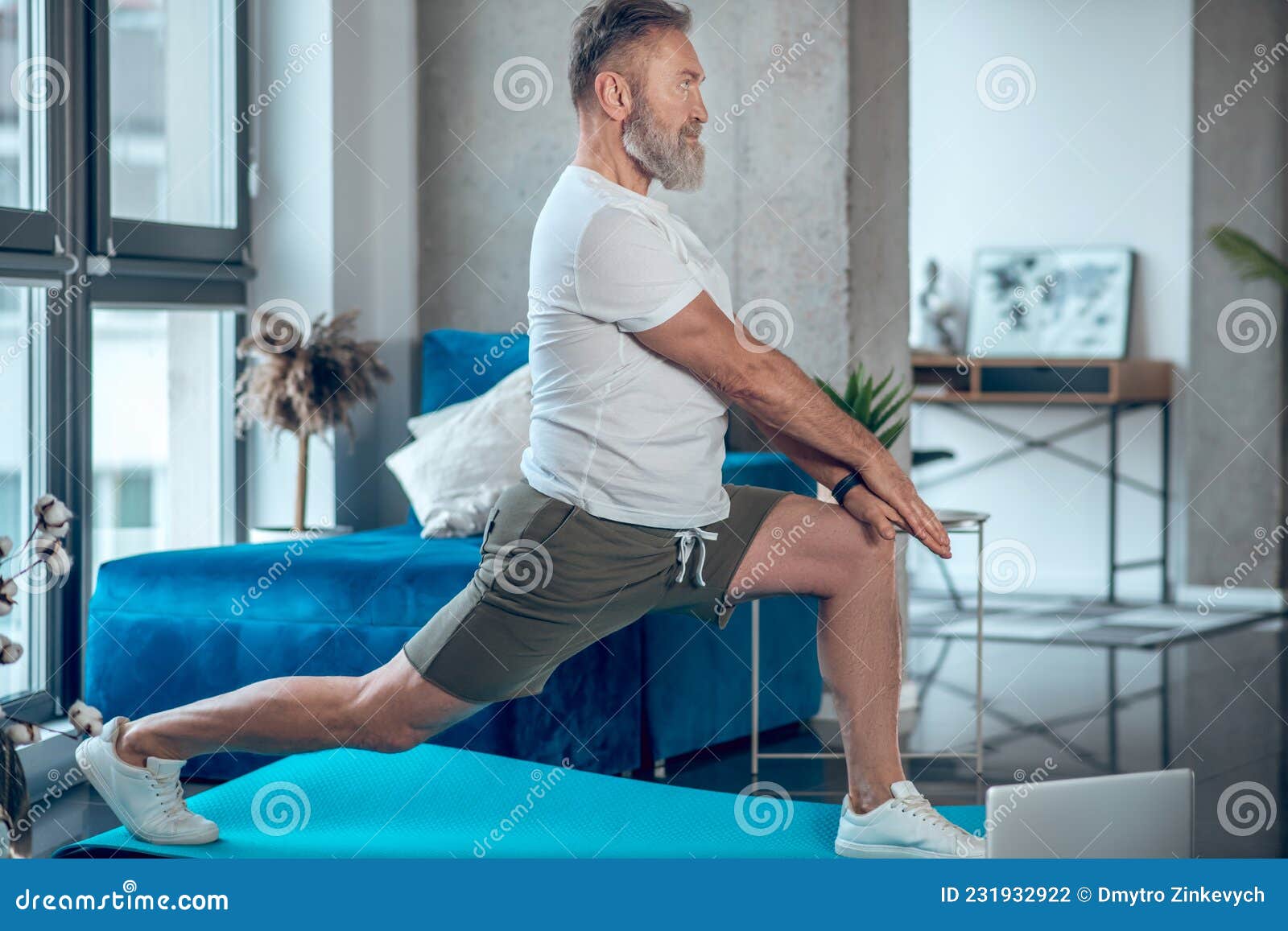 A Mature Man Having a Workout and Doing Long Steps Stock Photo - Image ...