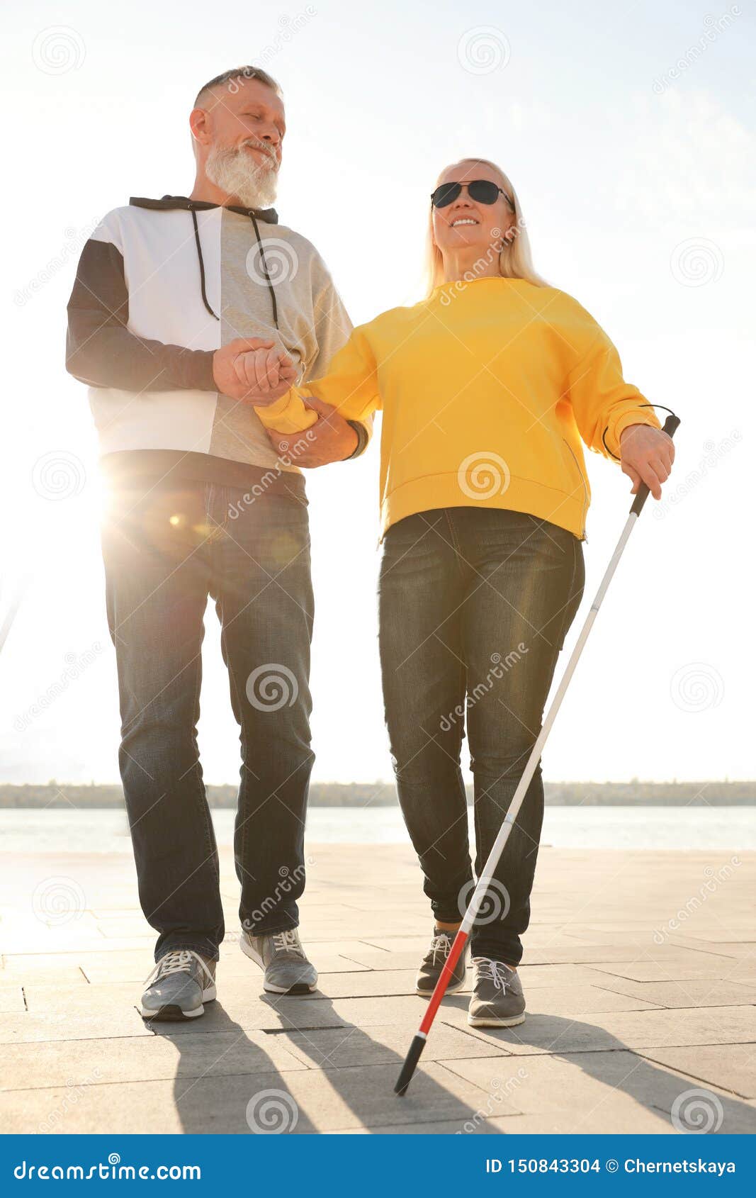 Mature Man Helping Blind Person with Long Cane Stock Photo - Image of ...