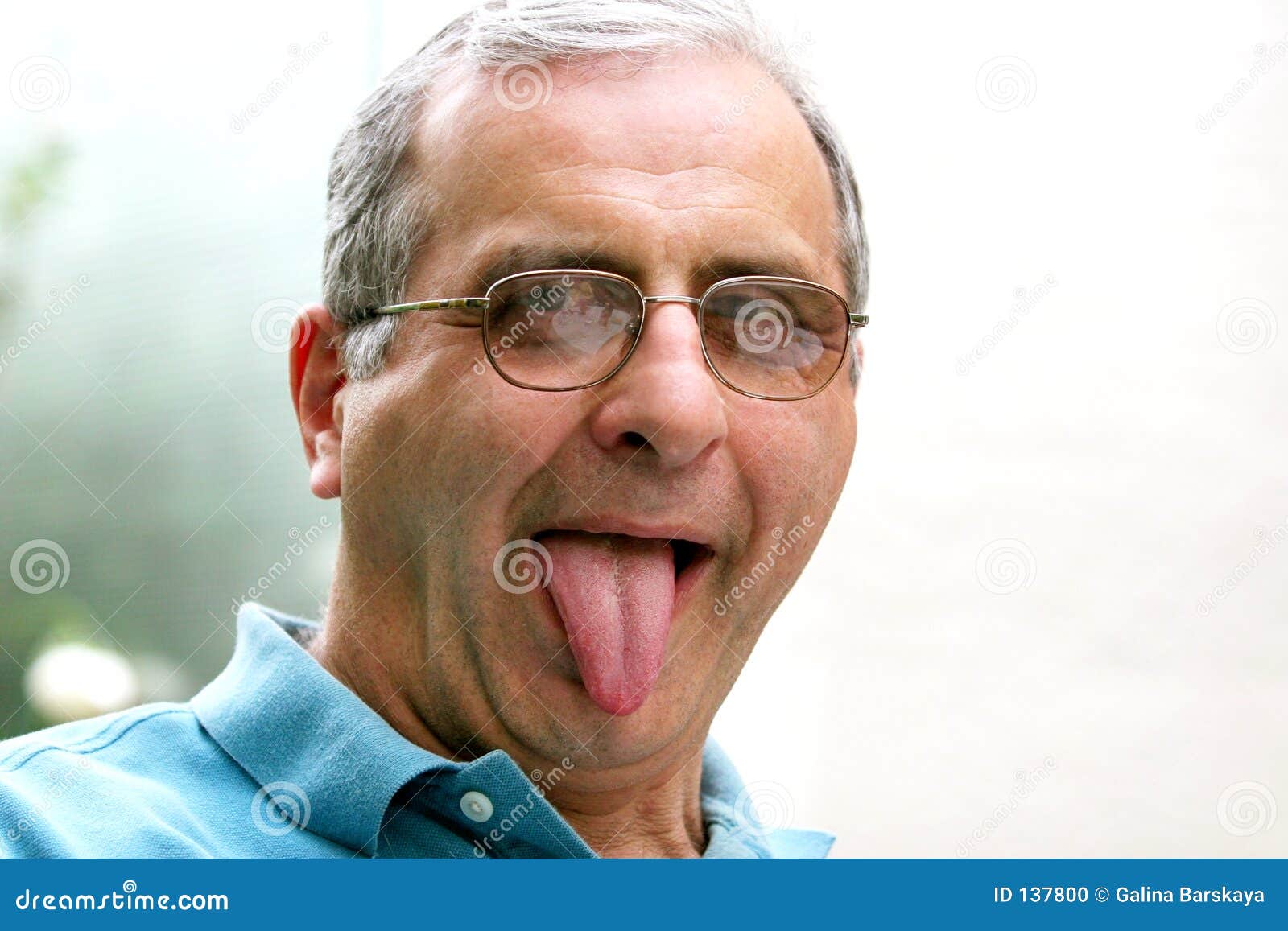 Mature Man with His Tongue Out Stock Photo - Image of enjoy, enjoying ...