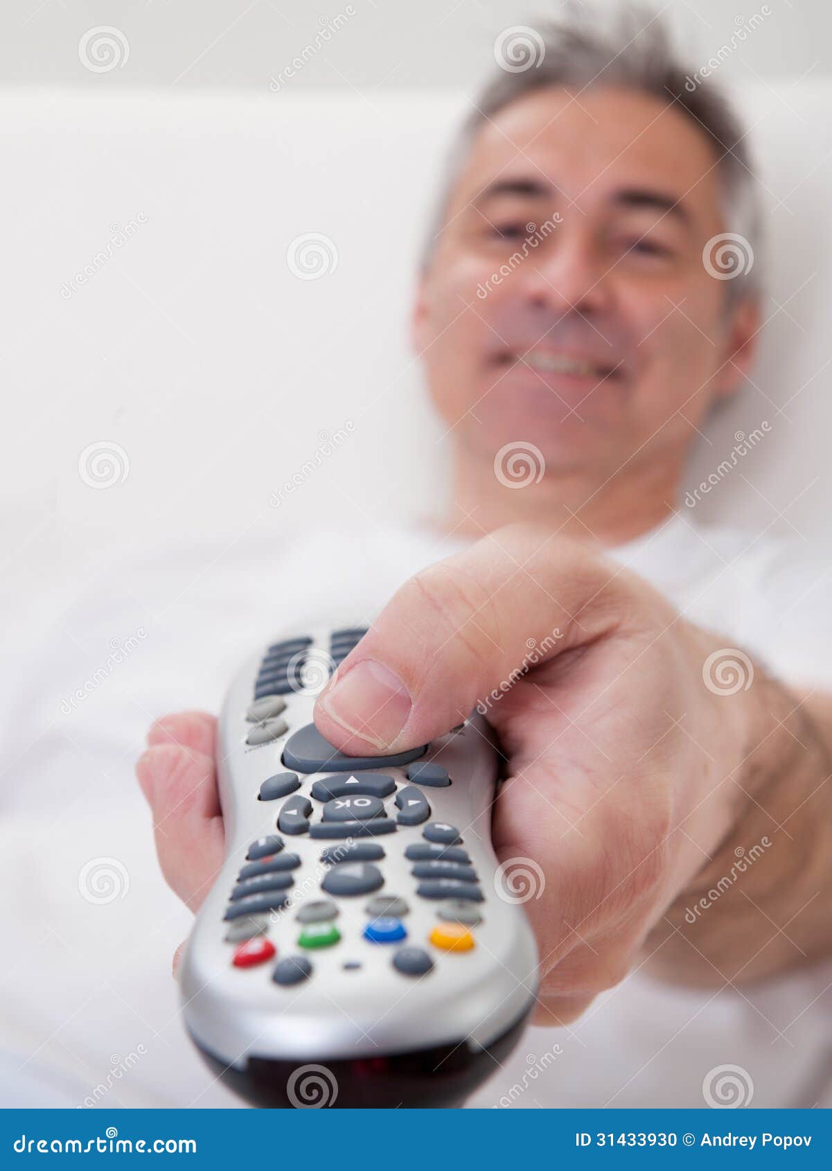 Mature Man Holding Remote Control Stock Photo - Image of mature, modern ...