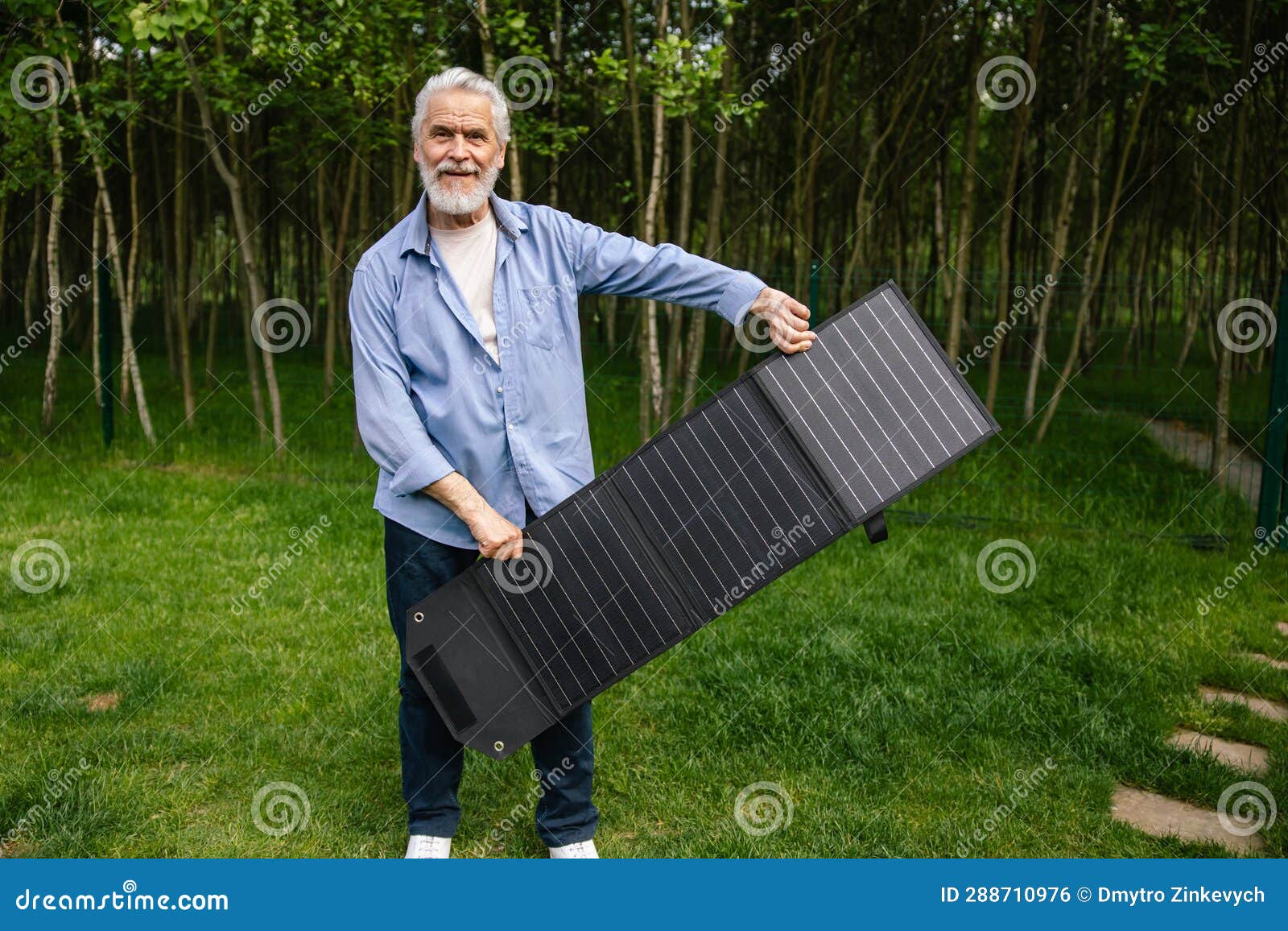 Mature Man Holding Solar Panel in Garden. Stock Photo - Image of panel ...