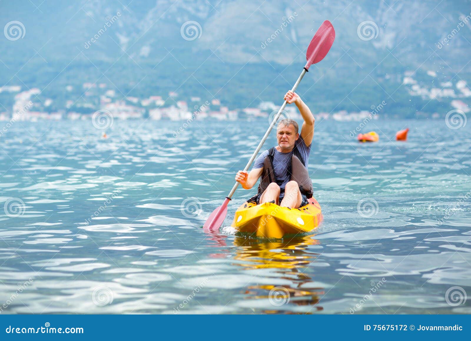 Mature Man Kayaking on the Sea Stock Photo - Image of activ, adventure ...