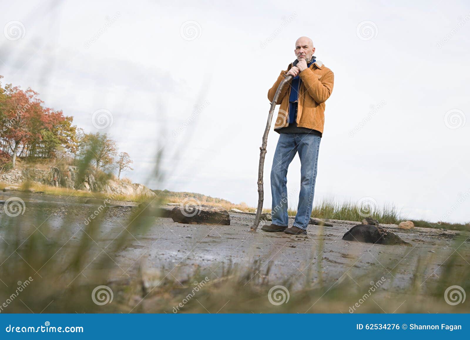 Mature Man Leaning on a Stick Stock Photo - Image of copy, mature: 62534276