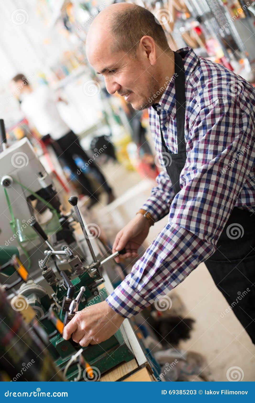 Mature Man Making Duplicates of Keys Stock Image - Image of assistance ...
