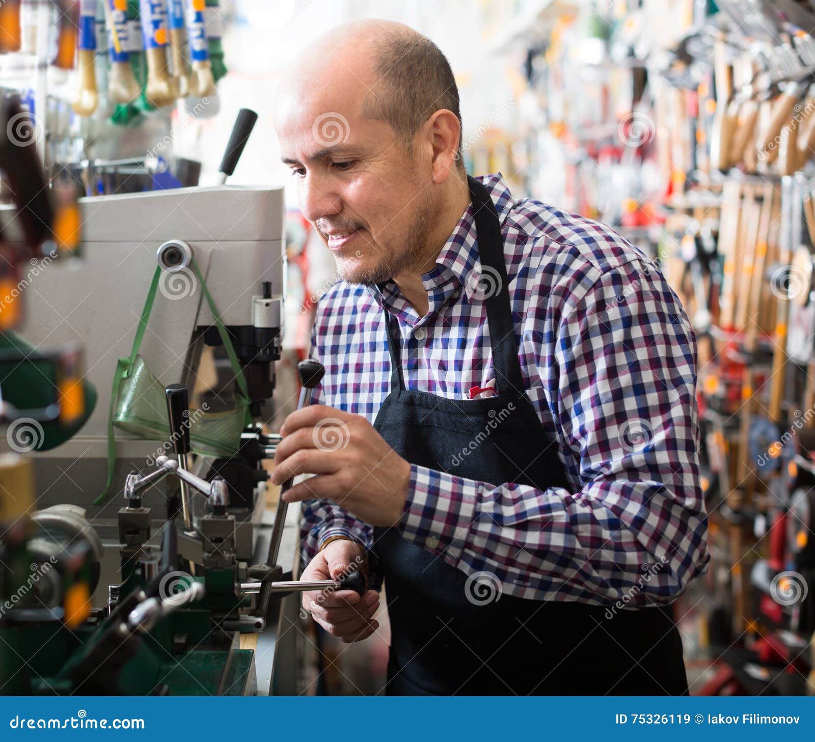 Mature Man Making Duplicates of Keys Stock Image - Image of elderly ...