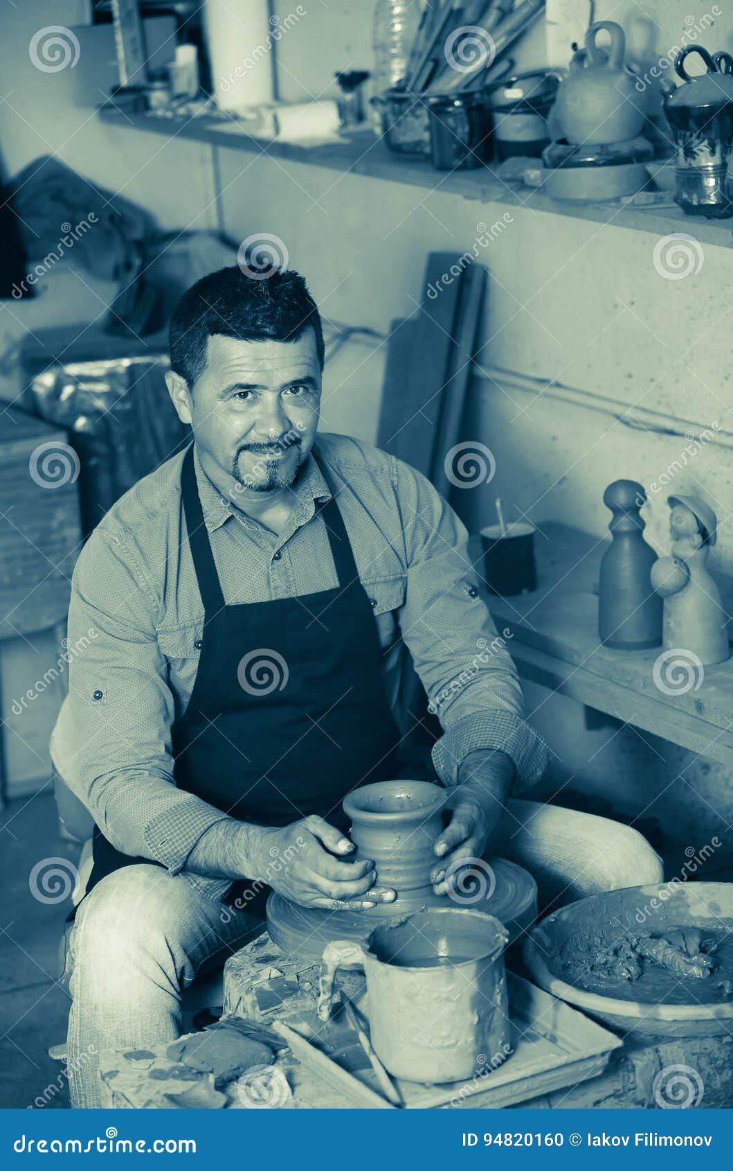 Mature man making pot stock photo. Image of creativity - 94820160
