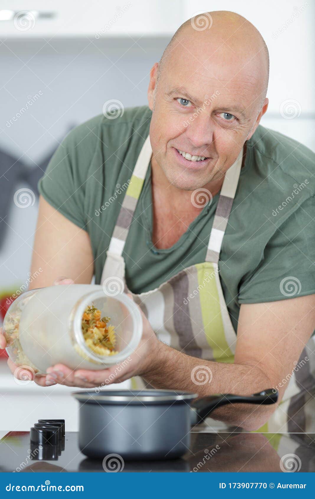 Mature Man Ooking Italian Pasta Stock Photo - Image of dark, cooking ...