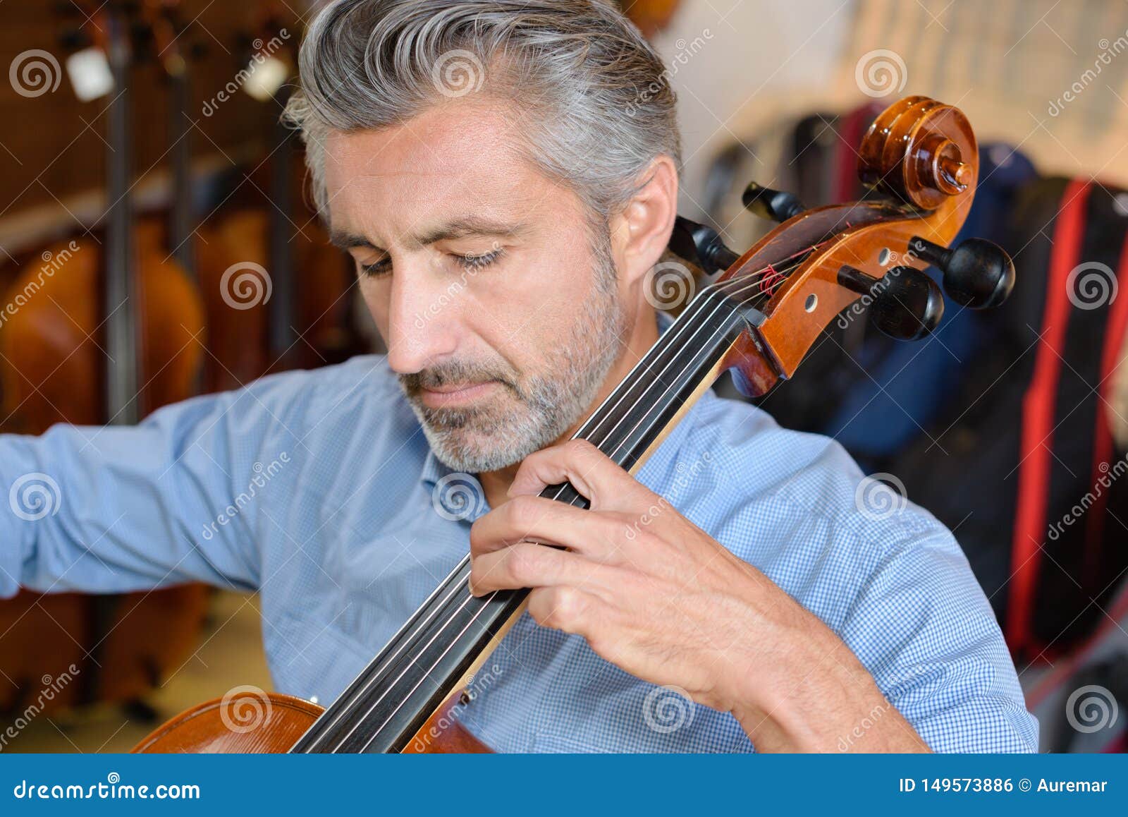 Mature man playing cello stock photo. Image of talent - 149573886