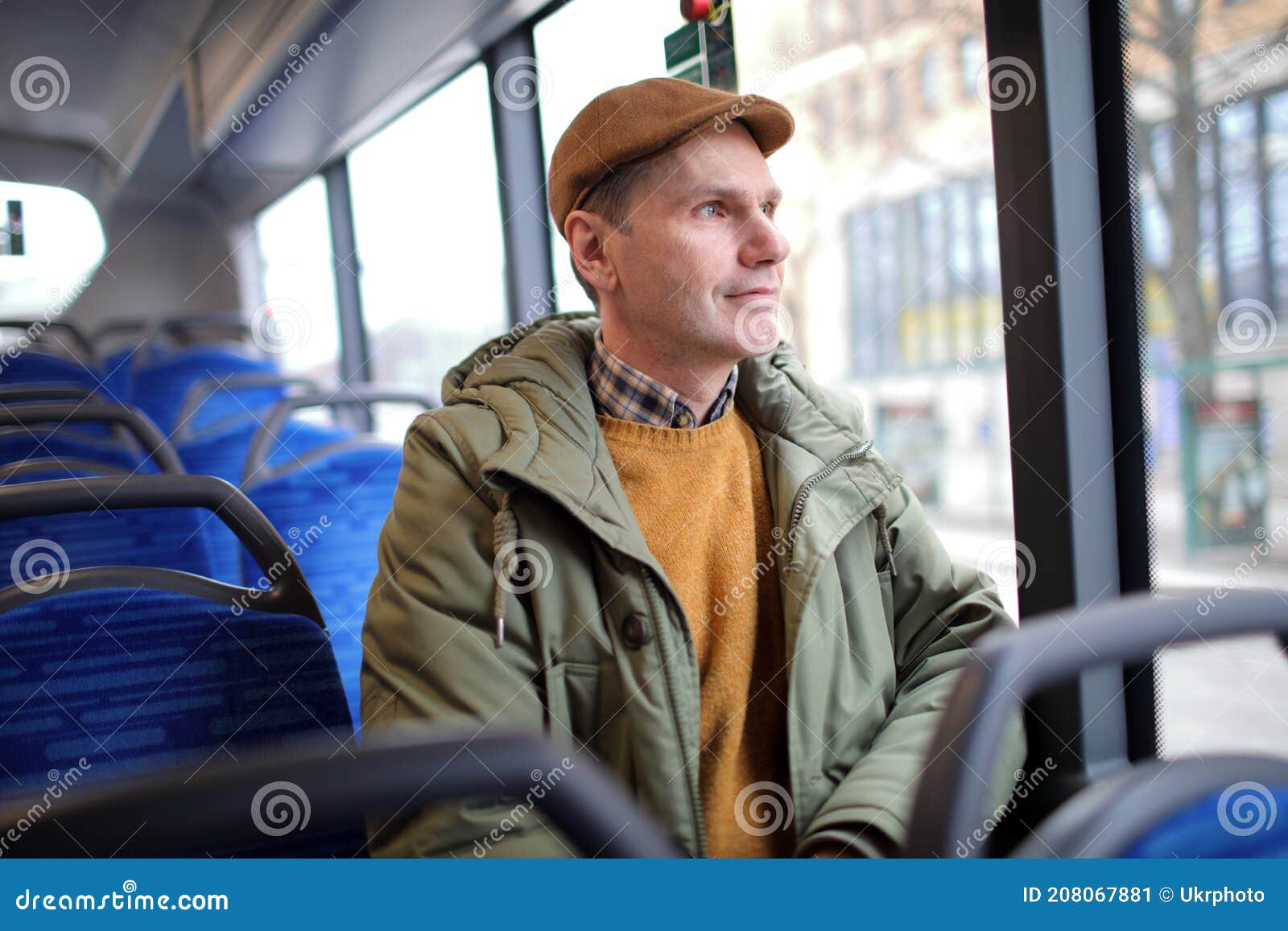 Mature man in a public bus stock image. Image of vehicle - 208067881