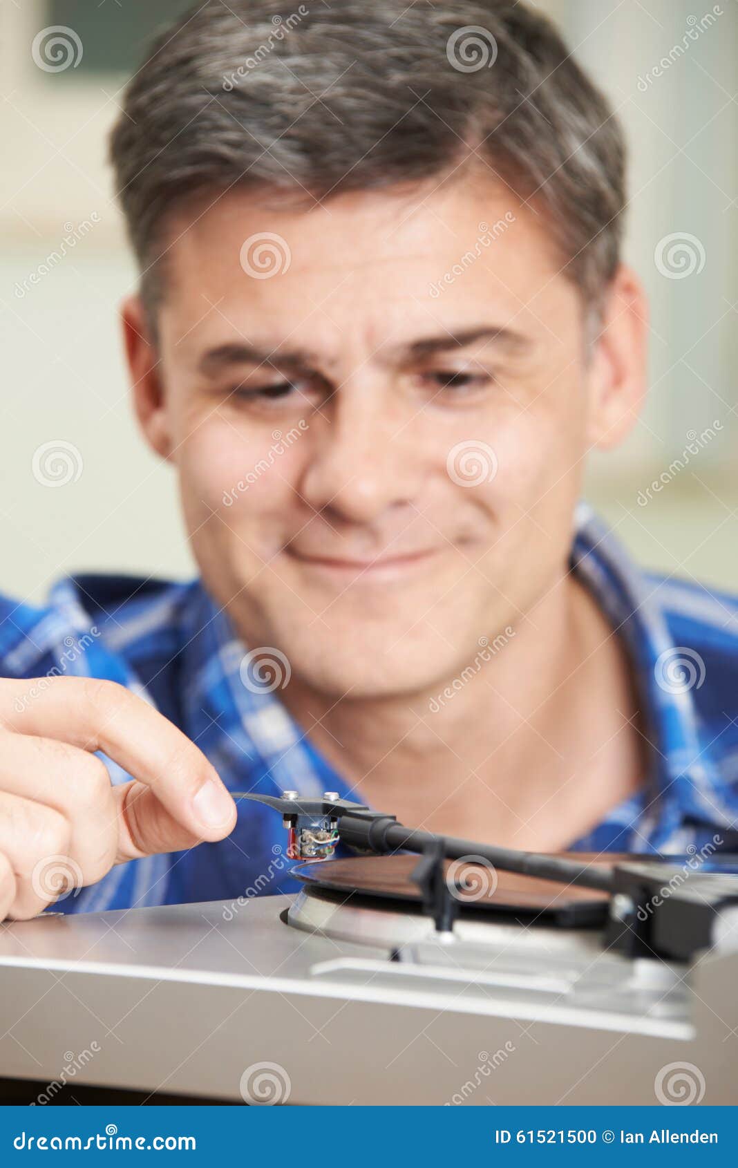 Mature Man Putting Vinyl Record on Player Stock Photo - Image of player ...