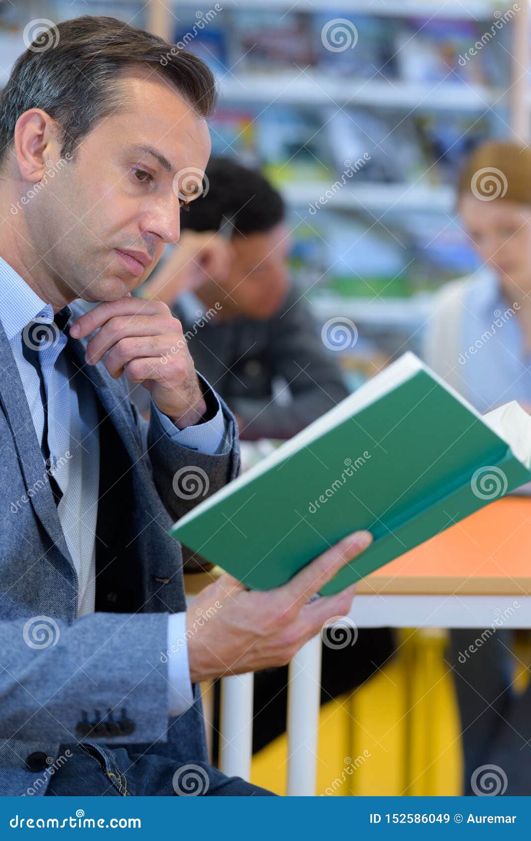 Mature Man Reading Book in Library Stock Image - Image of erudition ...