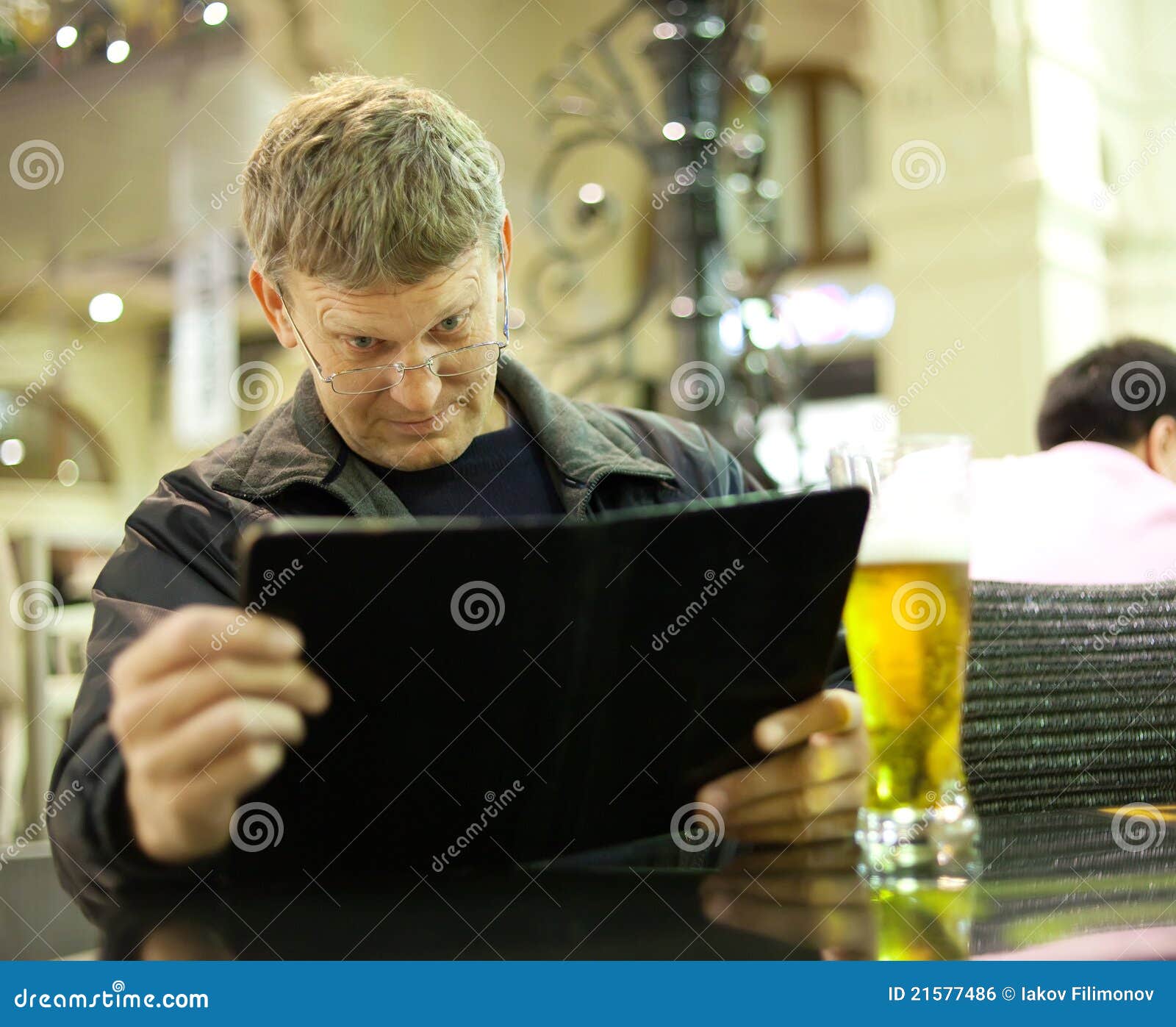 Mature Man Reading Menu Card Stock Photo - Image of cafe, room: 21577486