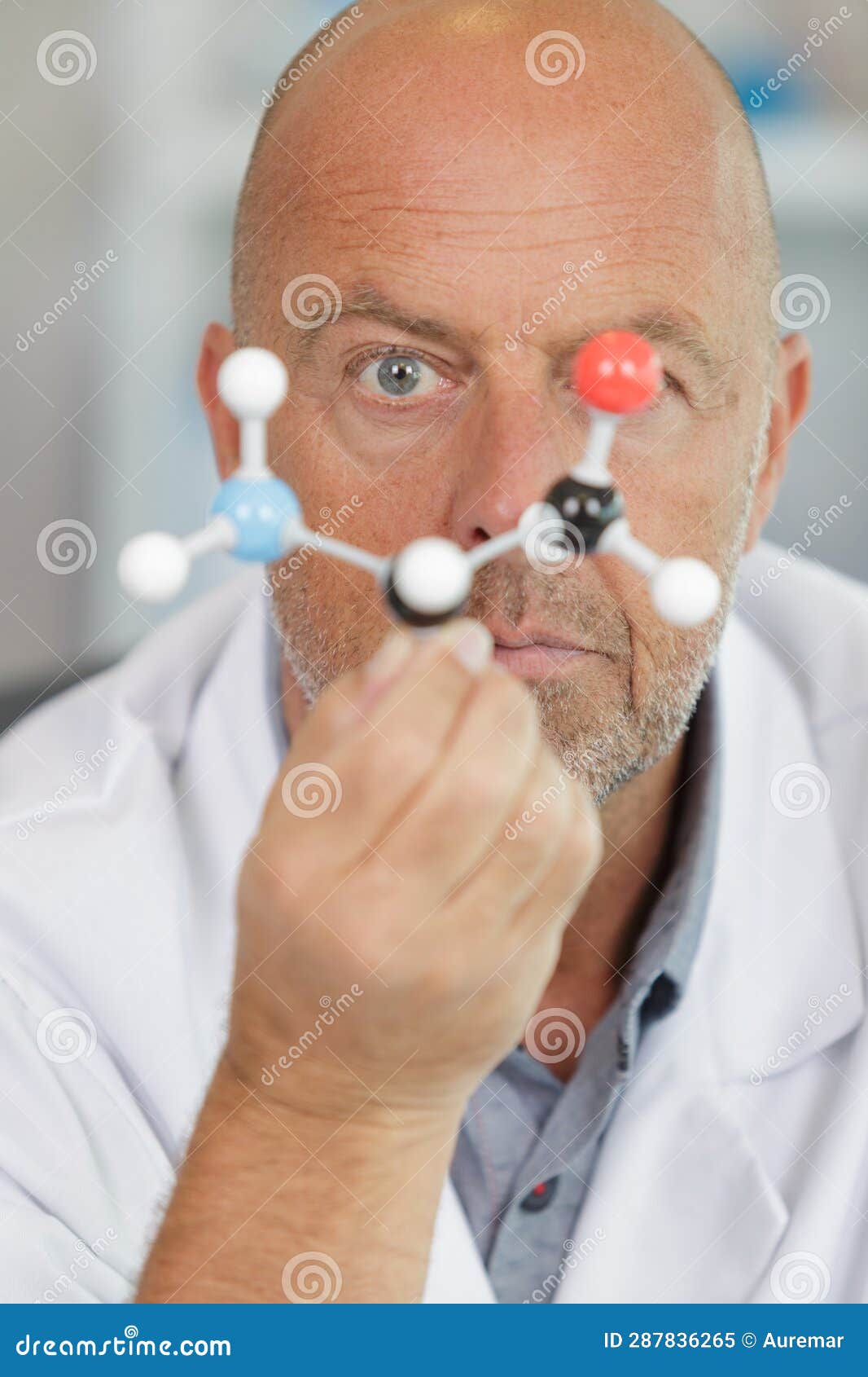 Mature Man Scientist in Eyeglasses Holding Molecular Model in Lab Stock ...