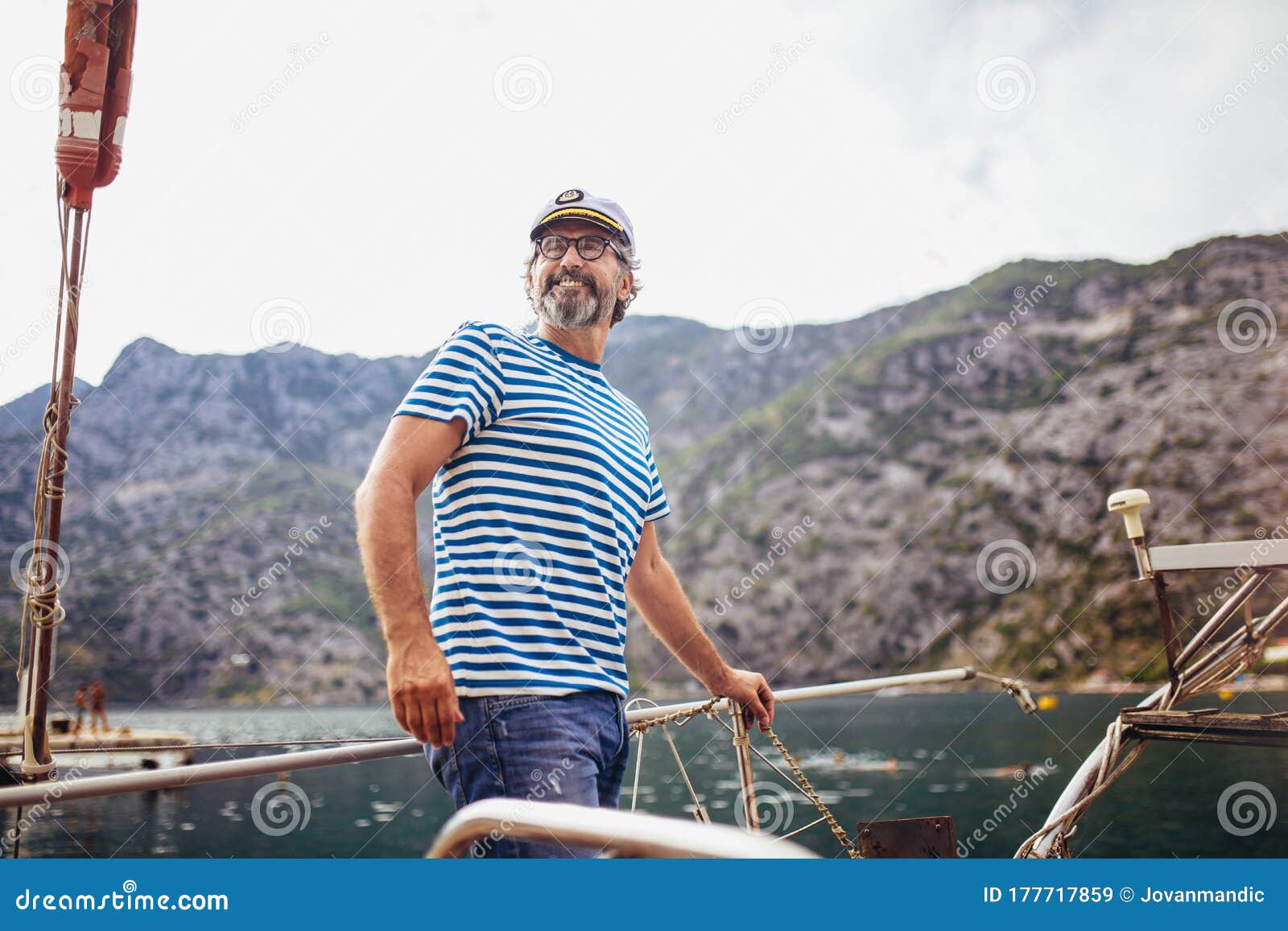 Man Standing on the Deck of His Boat on a Sunny Afternoon Stock Image ...