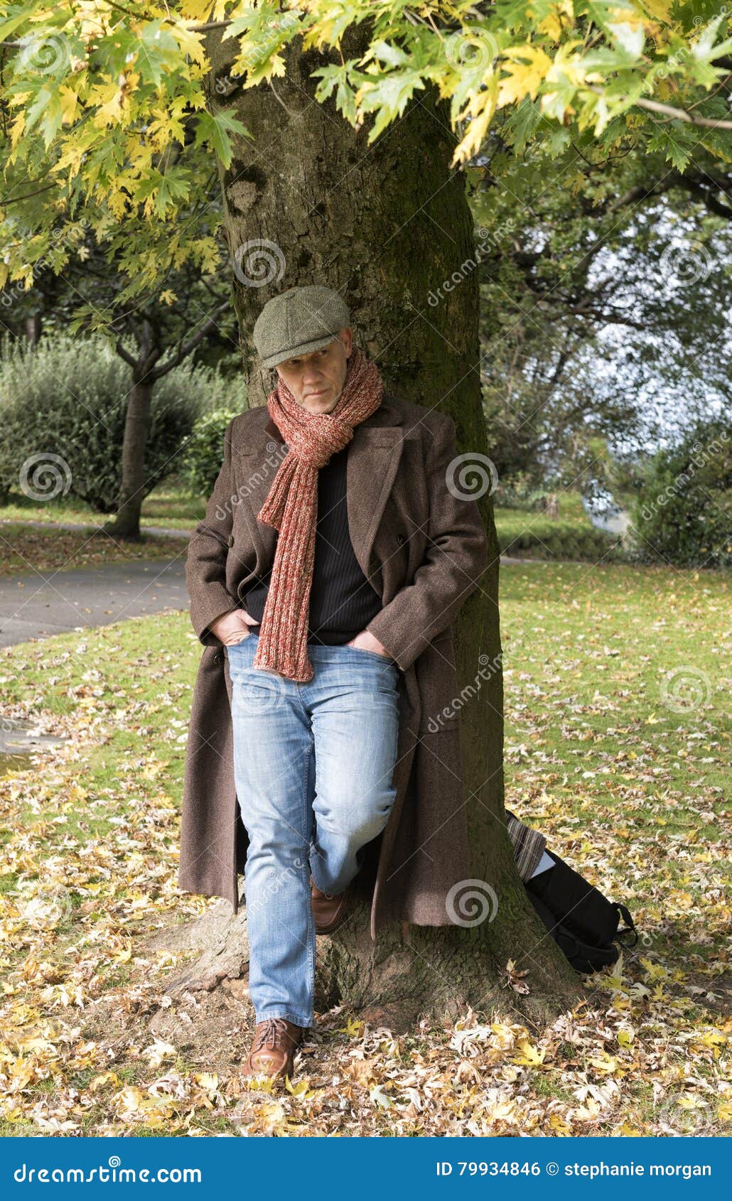 Mature Man Standing Under a Tree Outdoors. Stock Photo - Image of happy ...