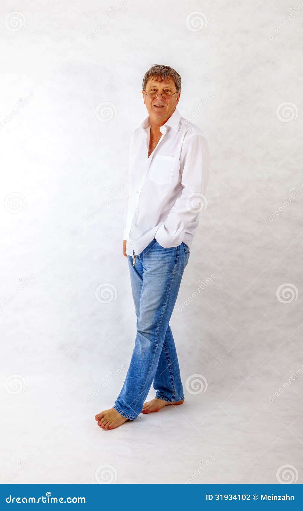 Mature Man Standing Up Against a White Background Stock Photo - Image ...