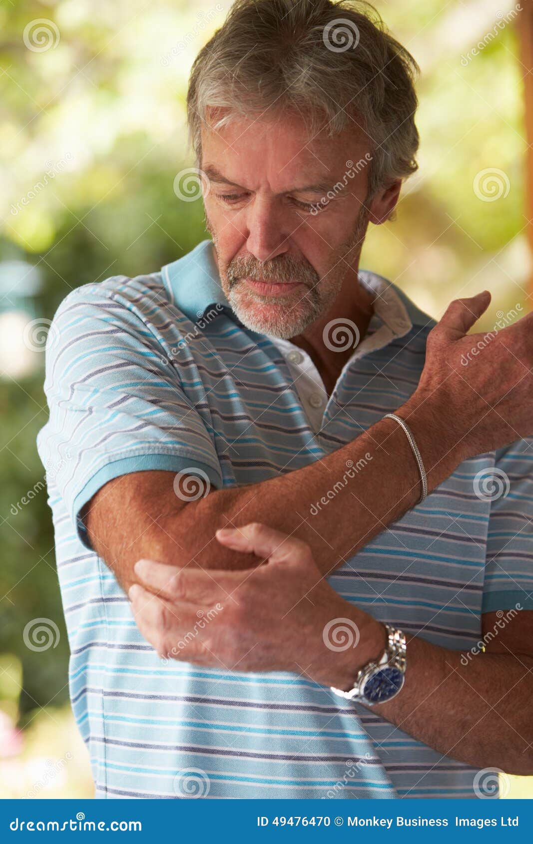 Mature Man Suffering from Painful Elbow at Home Stock Photo - Image of ...