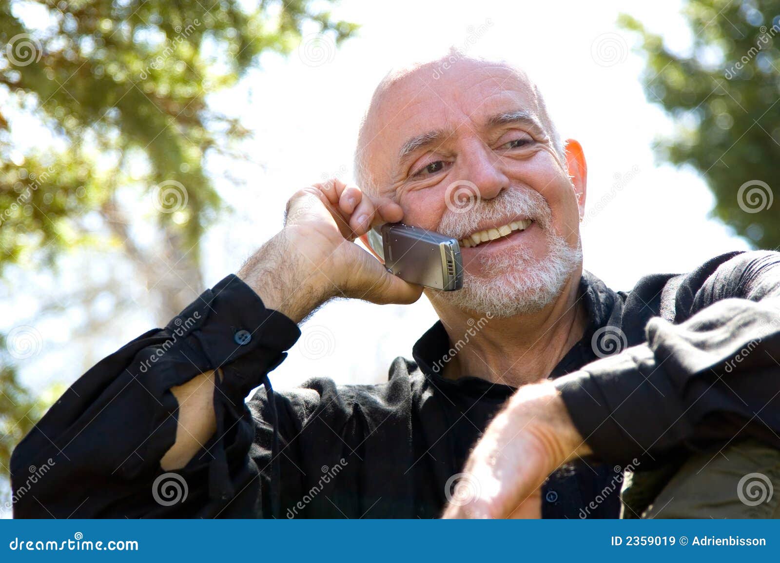 Mature Man Using a Cell Phone Stock Image - Image of intelligent, male ...