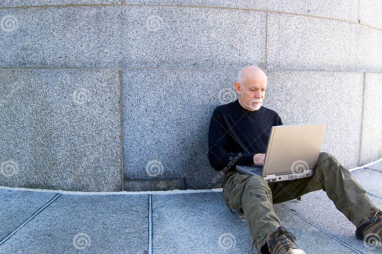 Mature Man Using a Computer Stock Image - Image of older, beard: 2358985