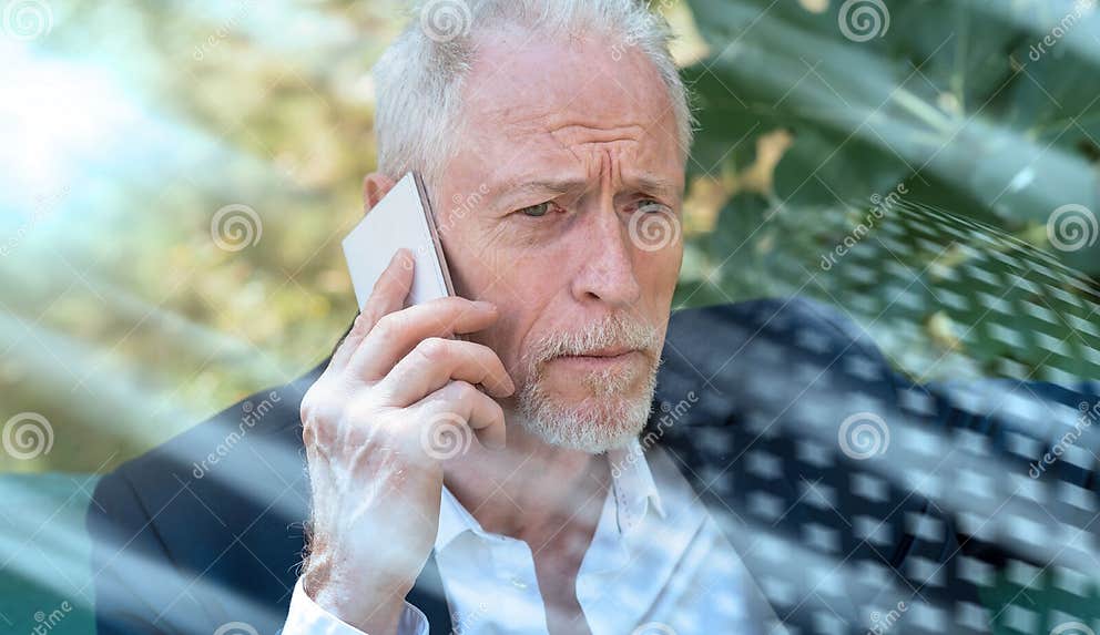 Mature Man Using His Mobile Phone, Light Effect Stock Photo - Image of ...