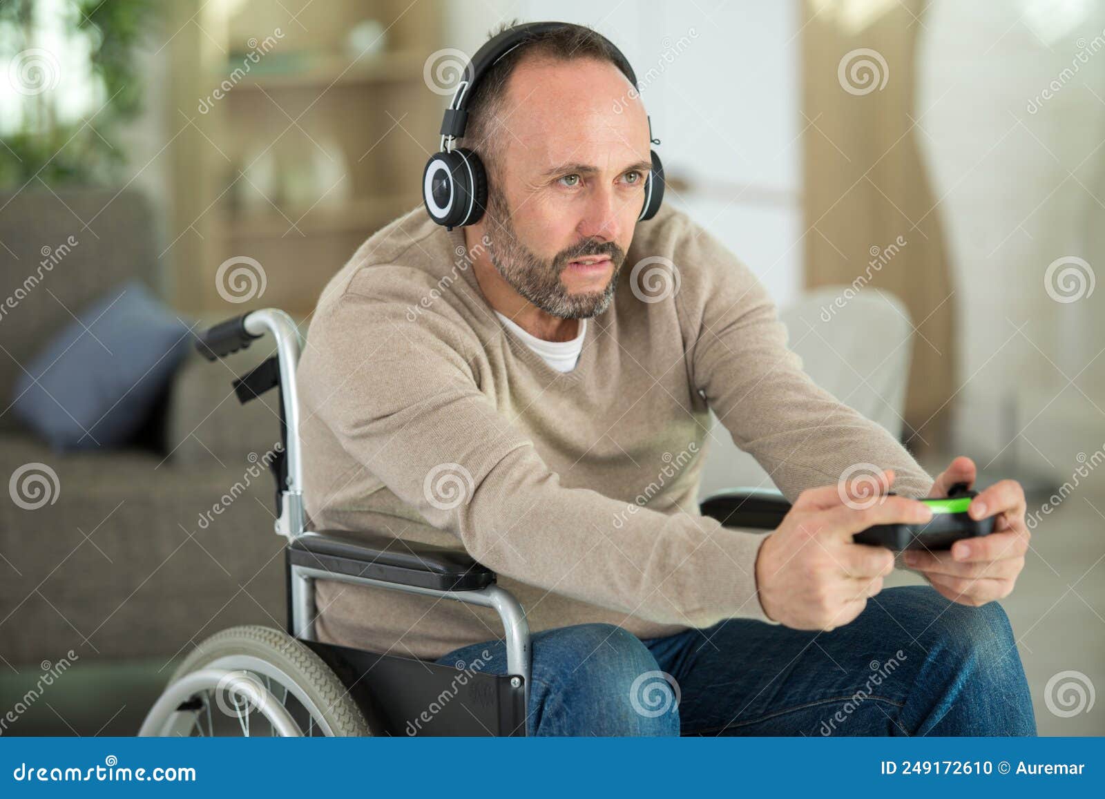 Mature Man in Wheelchair Playing Computer Game Stock Photo - Image of ...