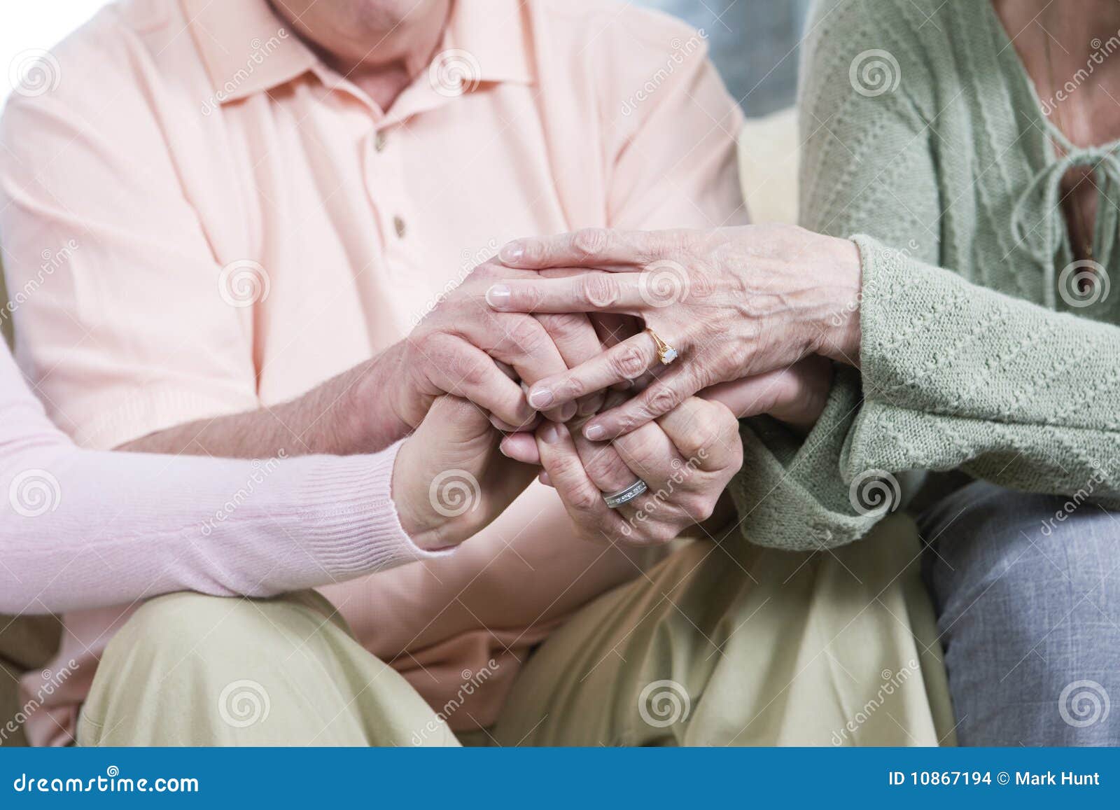 Mature People Holding Hands Stock Photo - Image of adult, hands: 10867194
